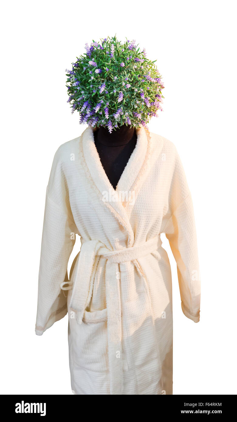 Human figure in a beige bathrobe with flower head Stock Photo - Alamy