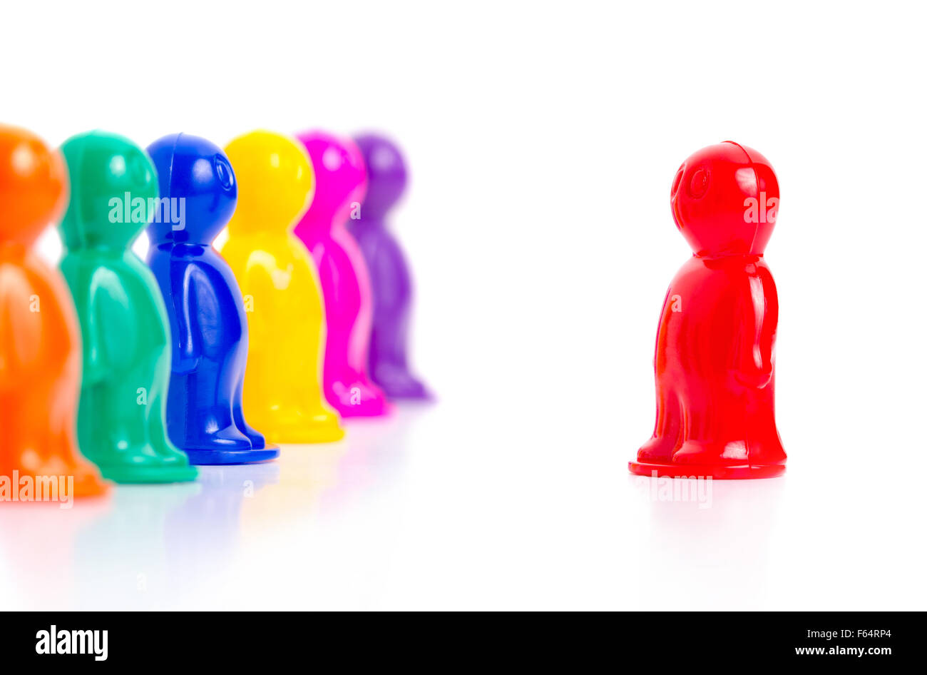Leader and the team. Colorful toy people group Stock Photo - Alamy