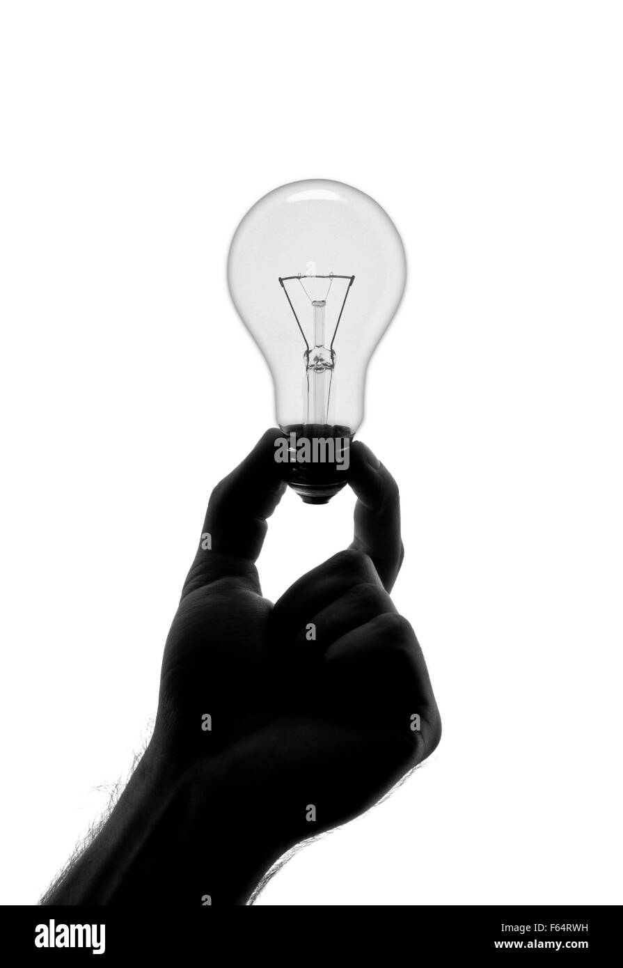 Human hand holding light bulb Black and White Stock Photos & Images - Alamy