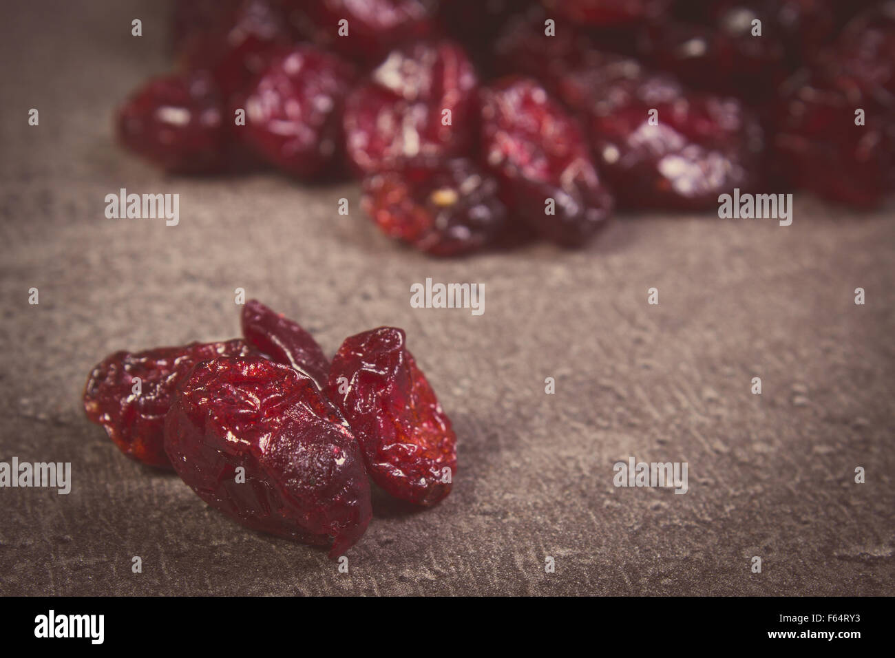 Vintage photo, Heap of red cranberries on structure of concrete ...