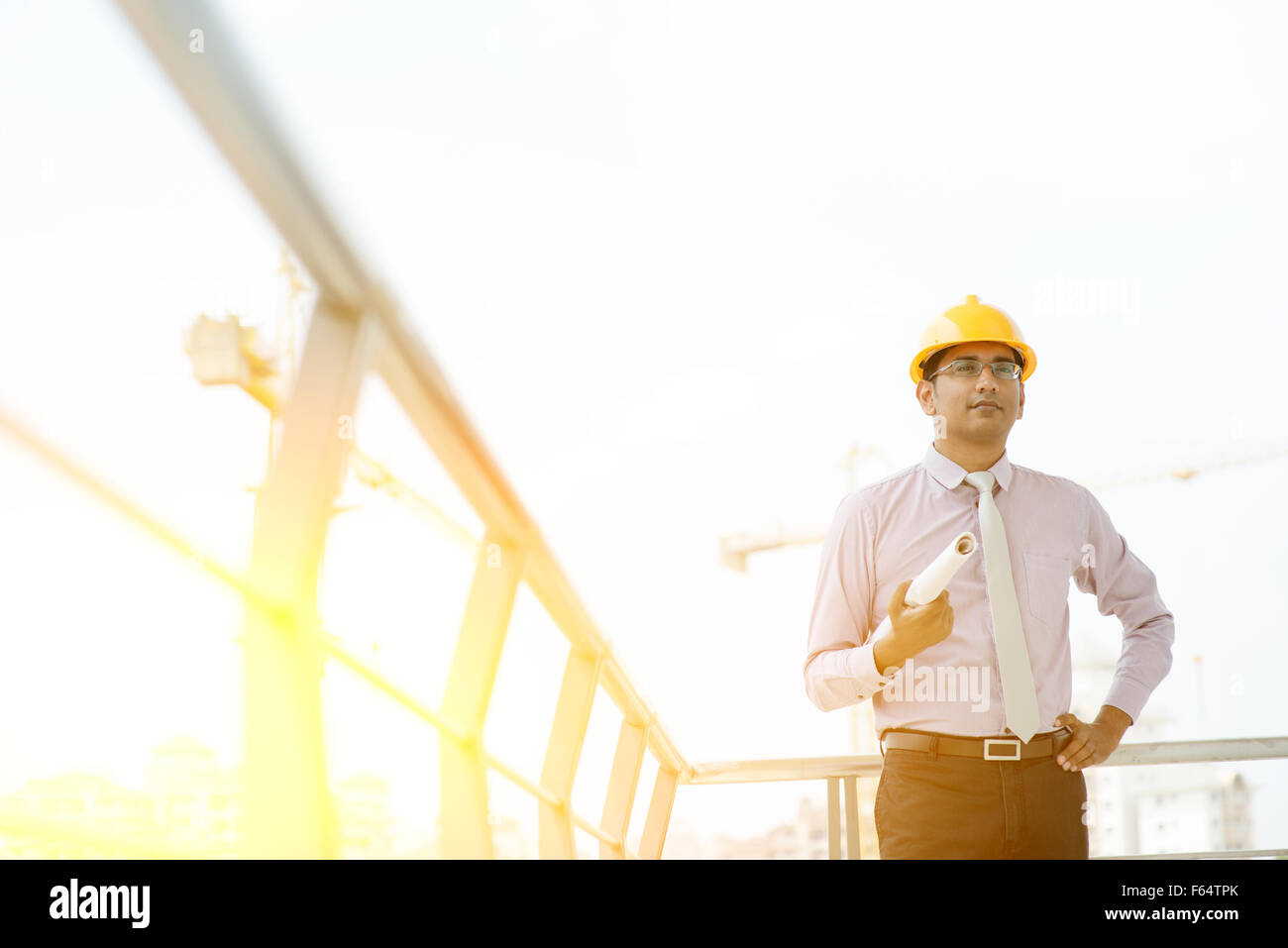 Portrait of Asian Indian male site contractor engineer with hard hat ...