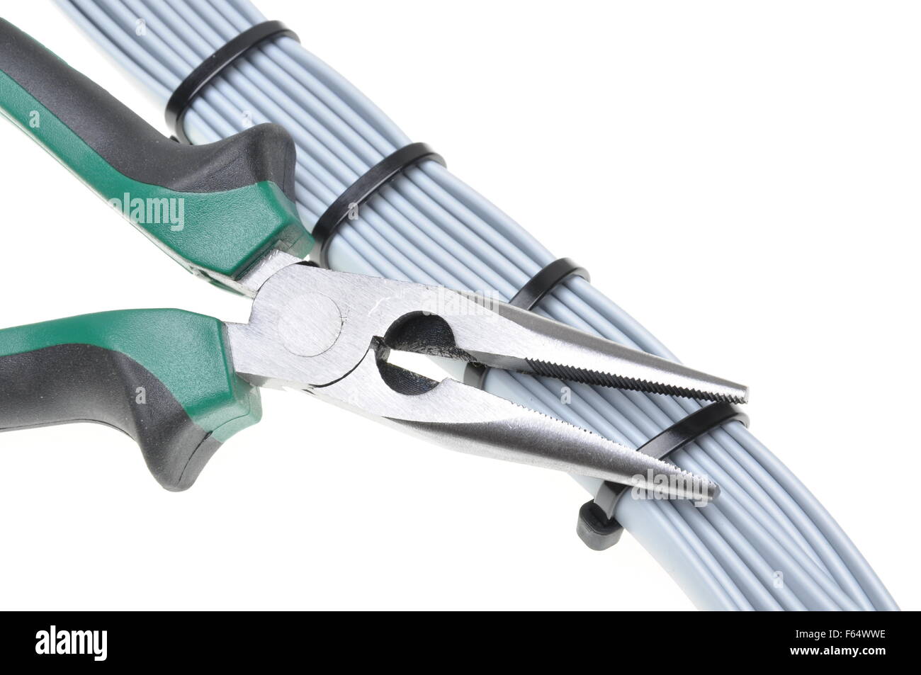 Pliers and cables isolated on white background Stock Photo - Alamy