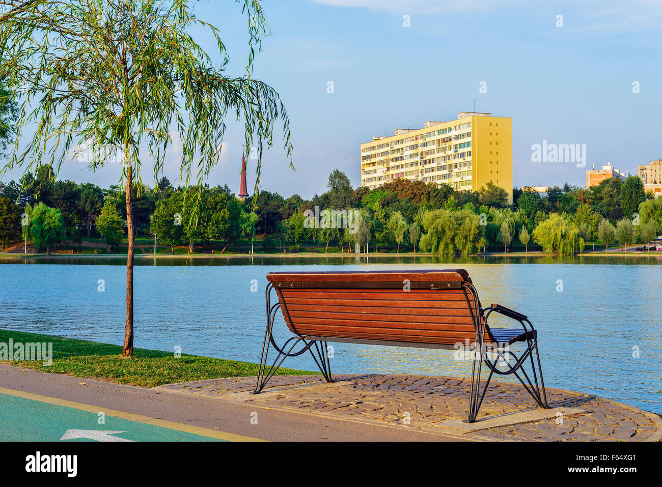 Bench in Titan / IOR park in a summer afternoon in Bucharest, Romania ...