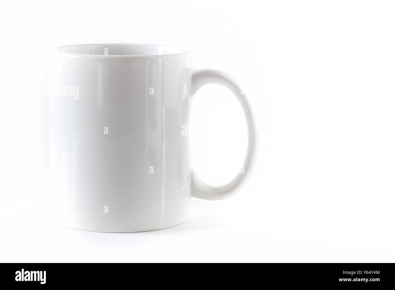 A white mug, empty, isolated on white background Stock Photo - Alamy