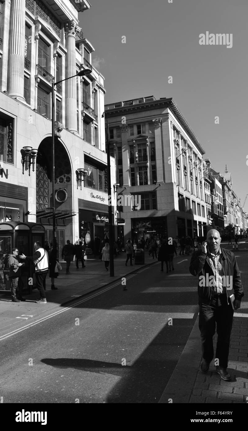 Man Walking Talking on Mobile Phone, Oxford Street, London, England, UK ...
