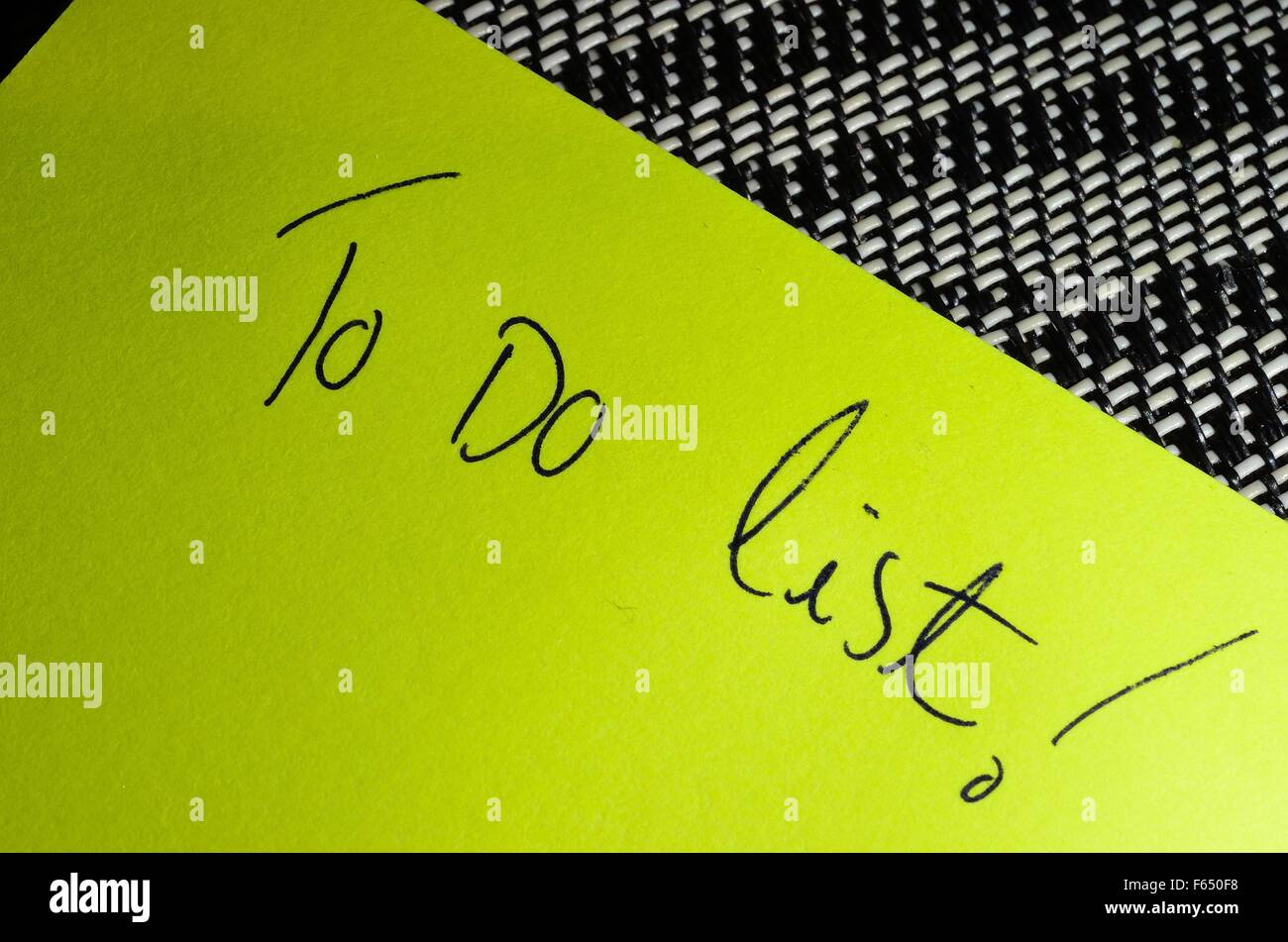 to do list on yellow notepad Stock Photo - Alamy