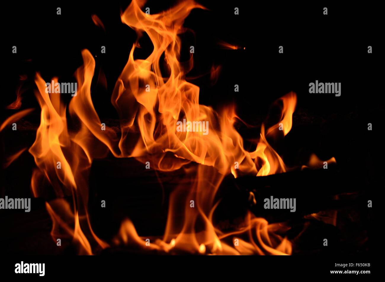 Burning birch log in the fireplace on a cold autumn day in Norway Stock ...