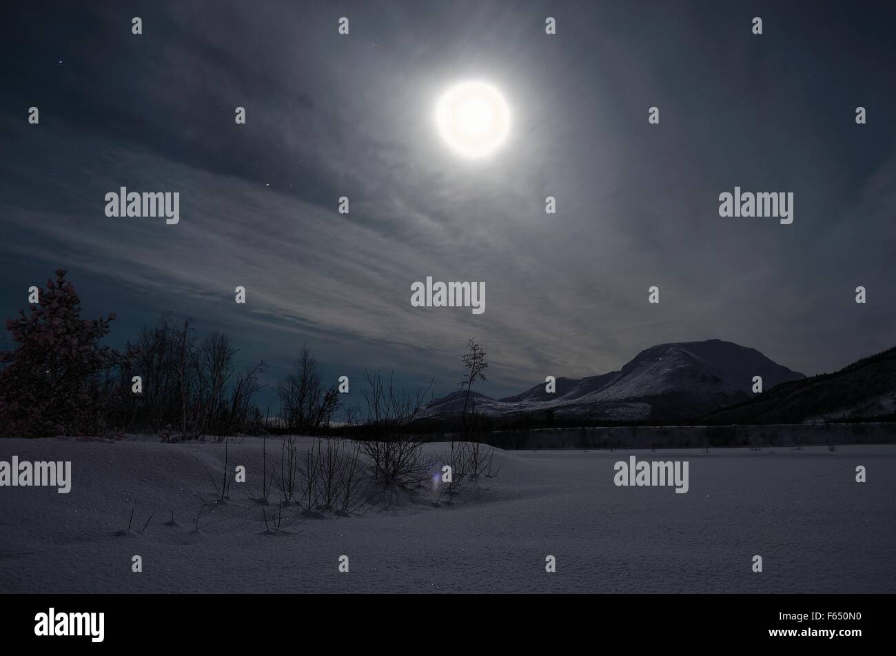 full moon over cold winter landscape in the arctic circle night Stock ...