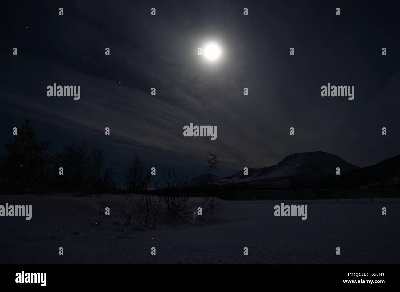 full moon over cold winter landscape in the arctic circle night Stock ...