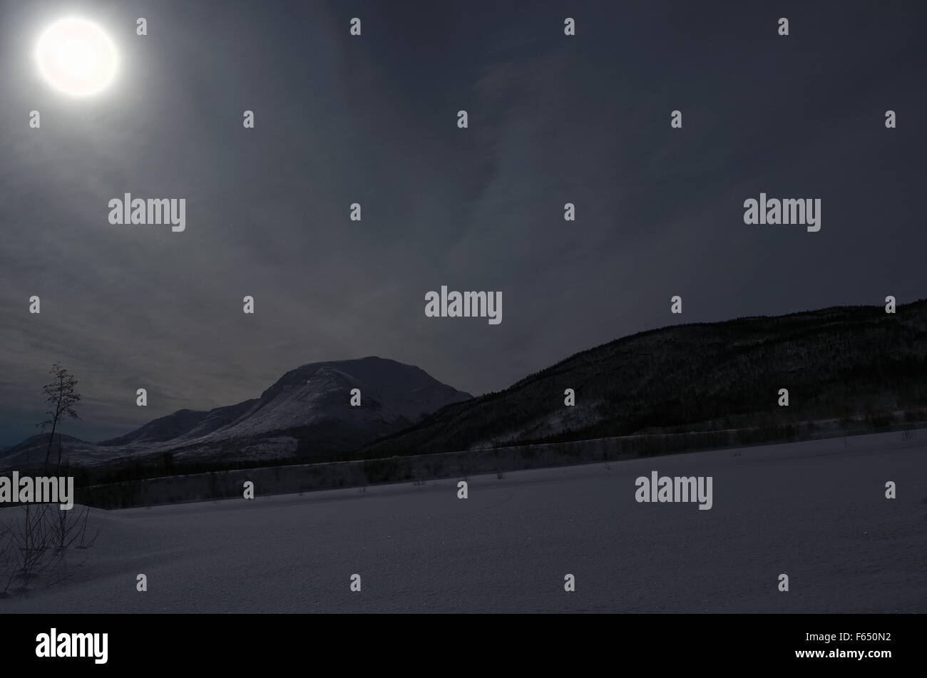 full moon over cold winter landscape in the arctic circle night Stock ...