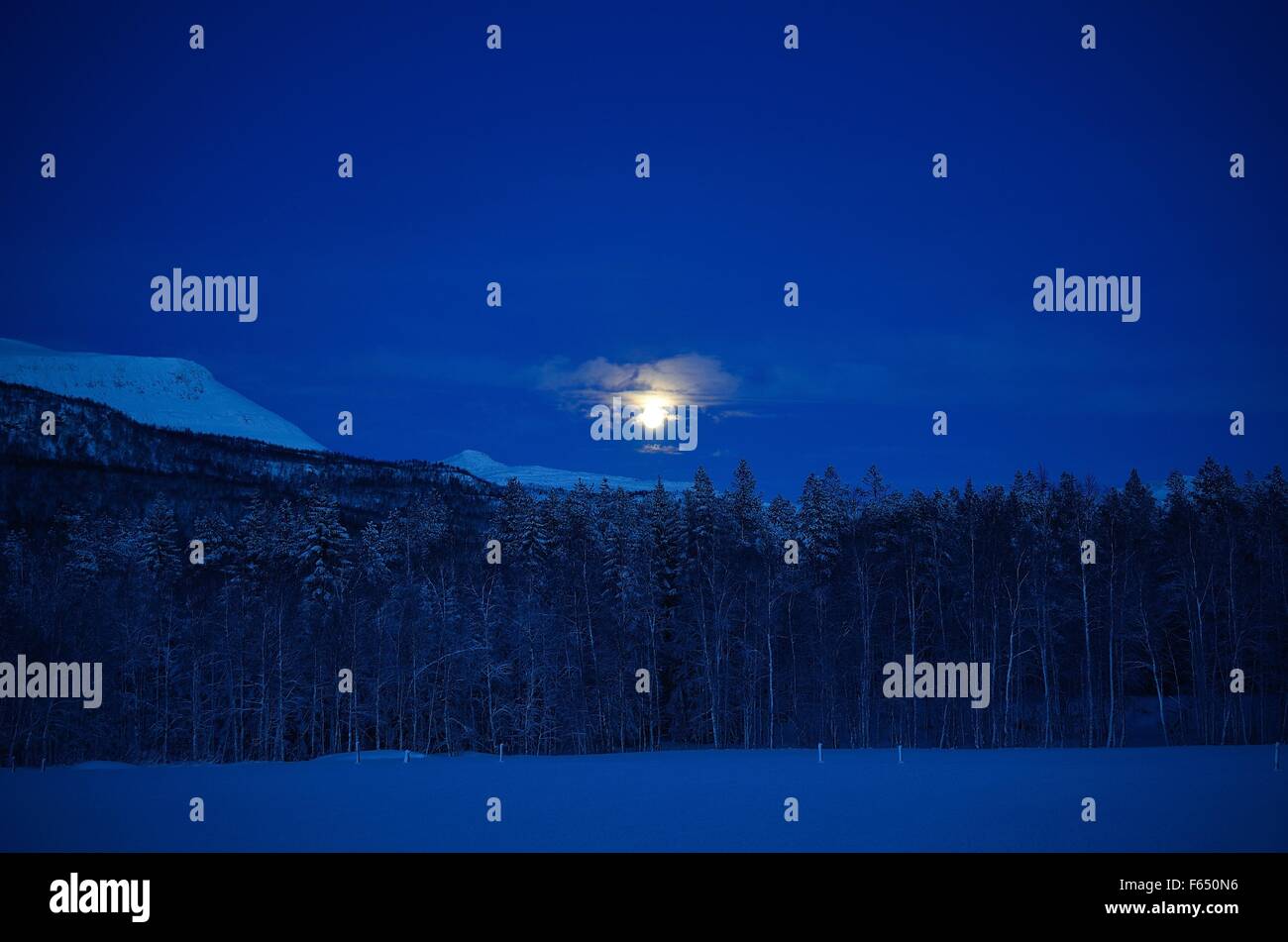 full moon over cold winter landscape in the arctic circle night Stock ...