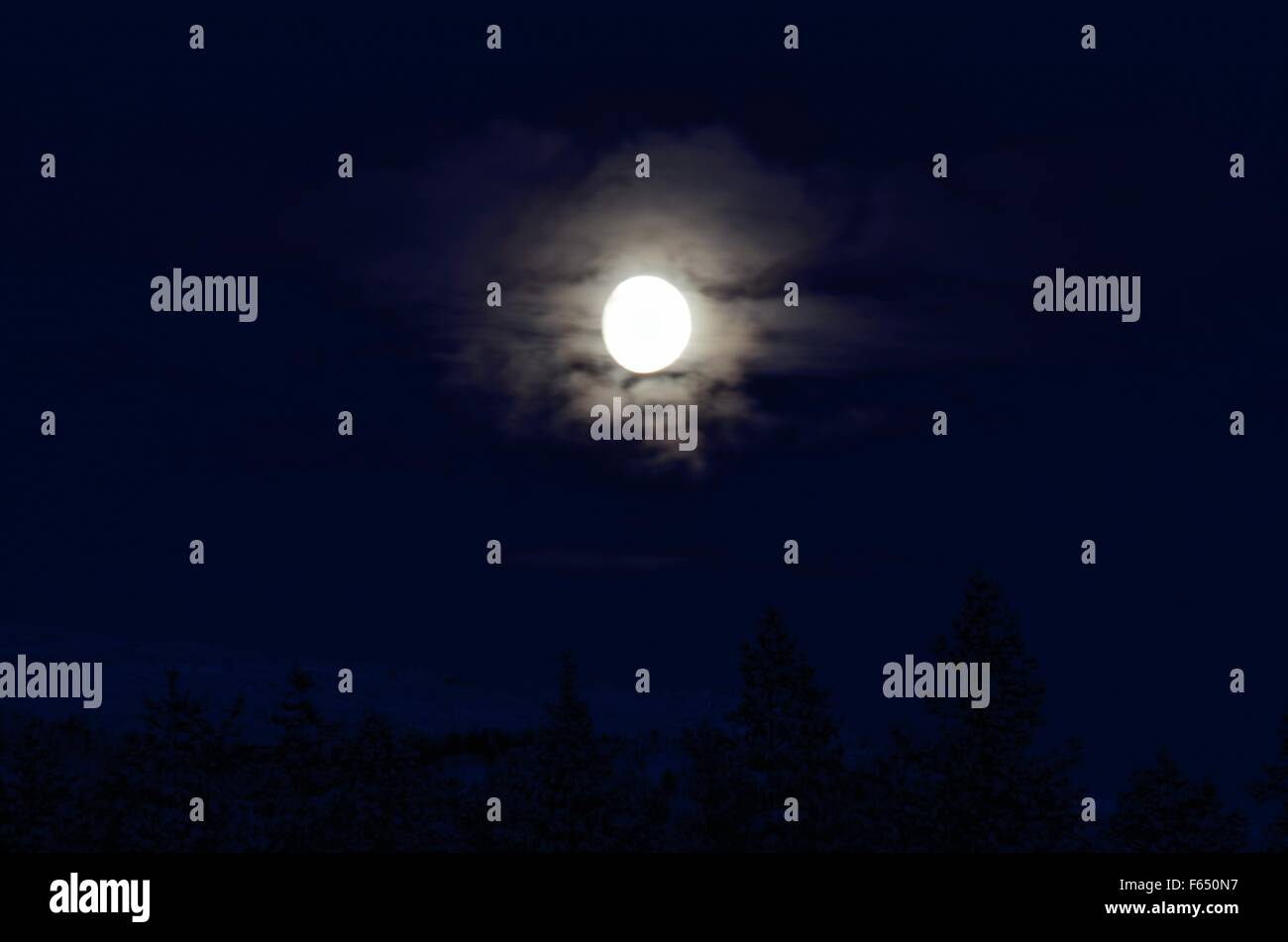 full moon over cold winter landscape in the arctic circle night Stock ...