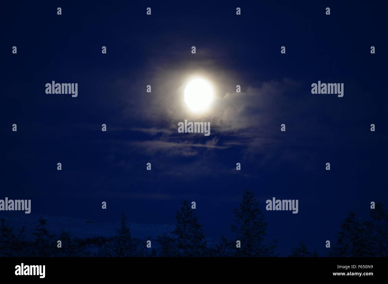 full moon over cold winter landscape in the arctic circle night Stock ...