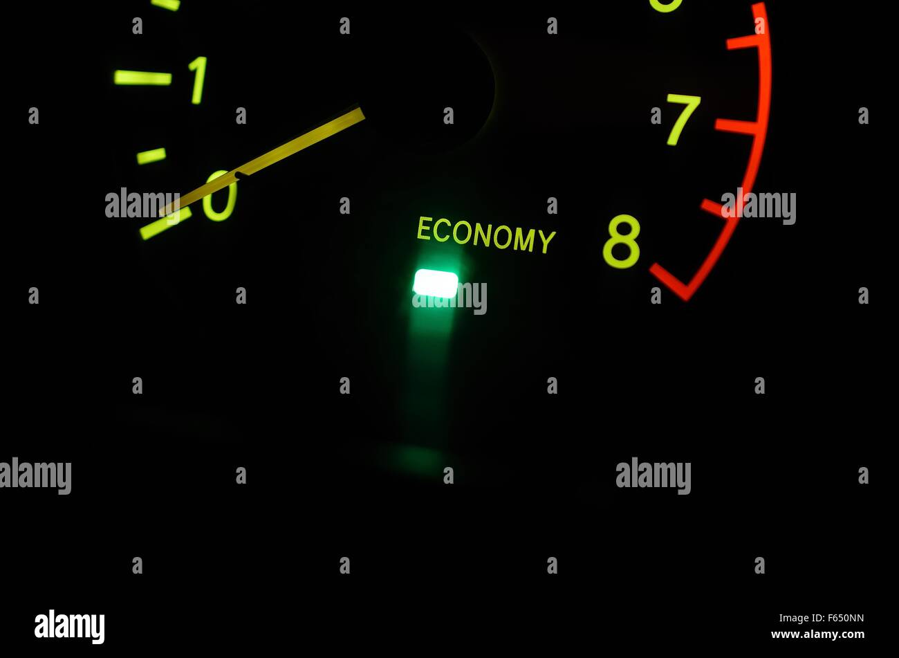 green economy light for fuel efficiency in car Stock Photo - Alamy