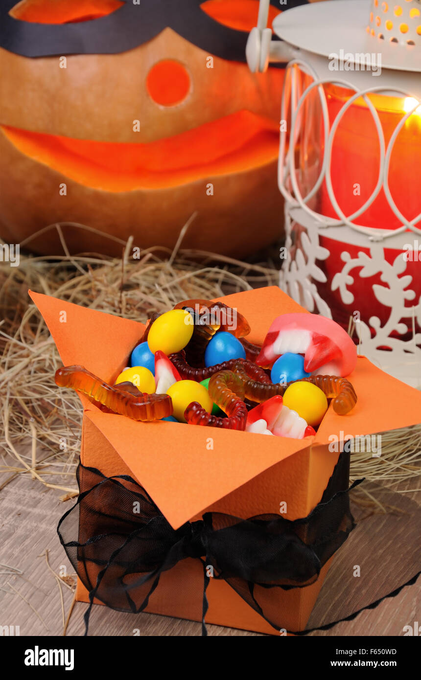box filled with a variety of sweets on the table for Halloween Stock ...