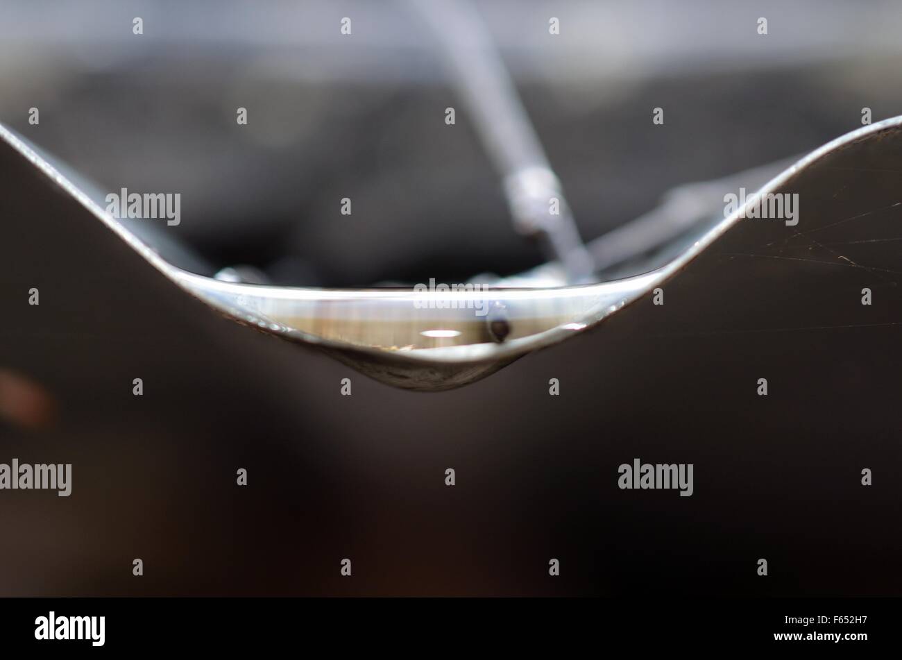 water dripping down corrigated steel plate Stock Photo - Alamy