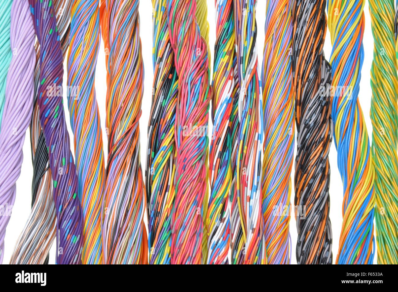 Multicolored telecommunication cables isolated on white background ...