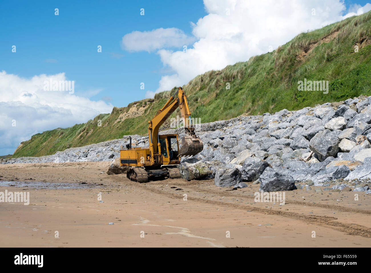 mechanical excavator working on coastal protection for the ballybunion ...