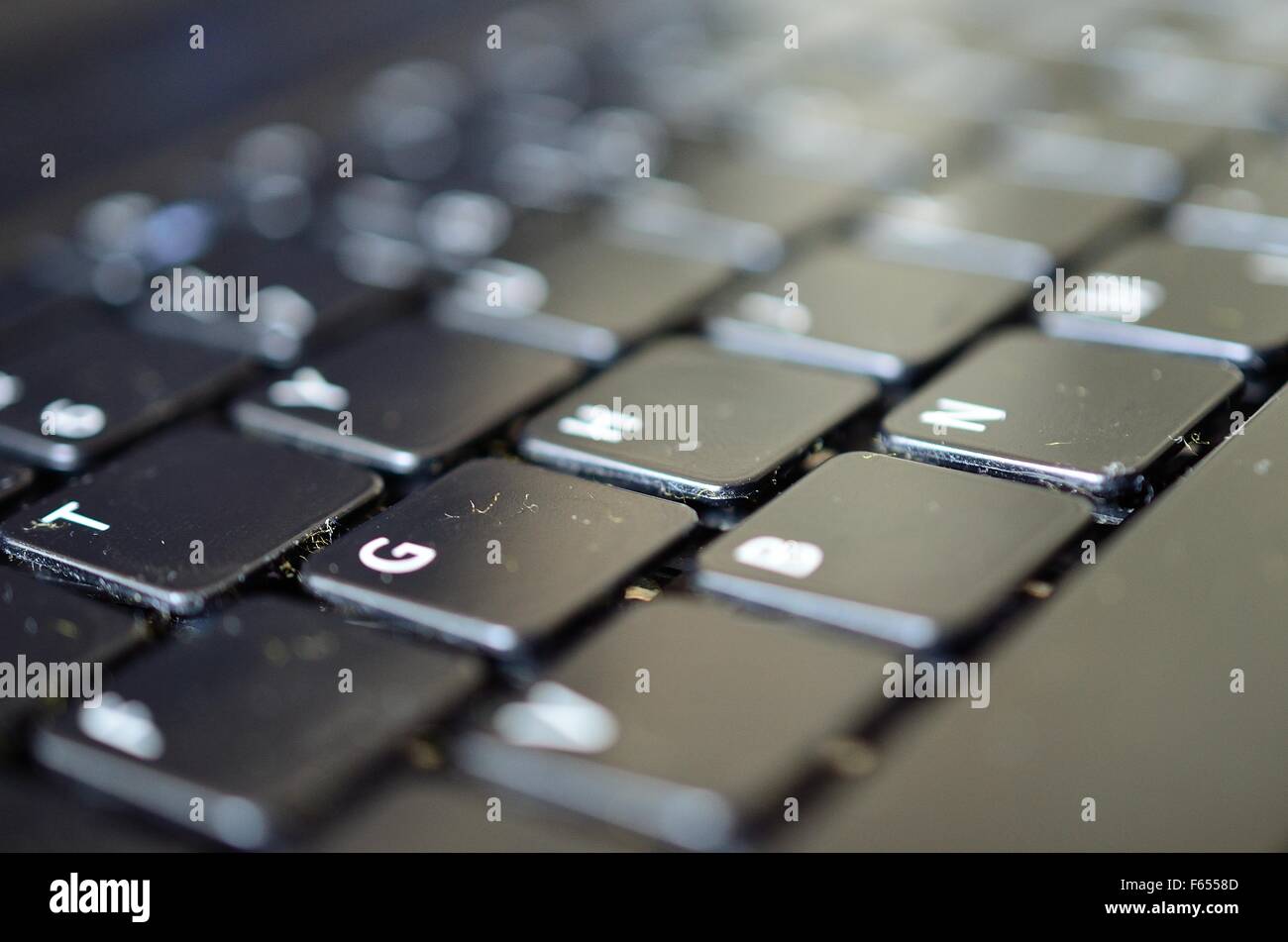 black laptop keyboard with white letter Stock Photo - Alamy