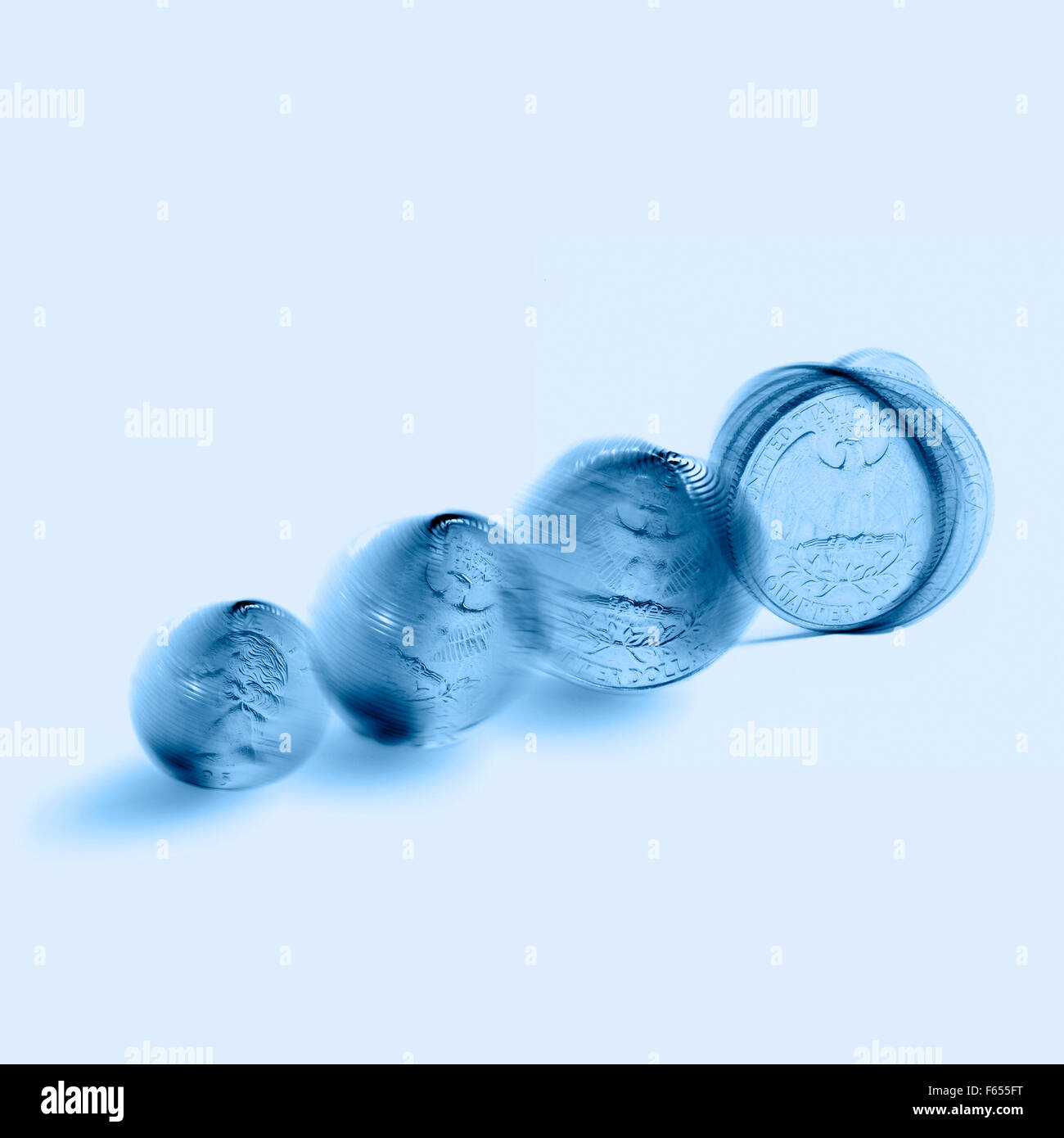 quarter spinning white background Stock Photo - Alamy