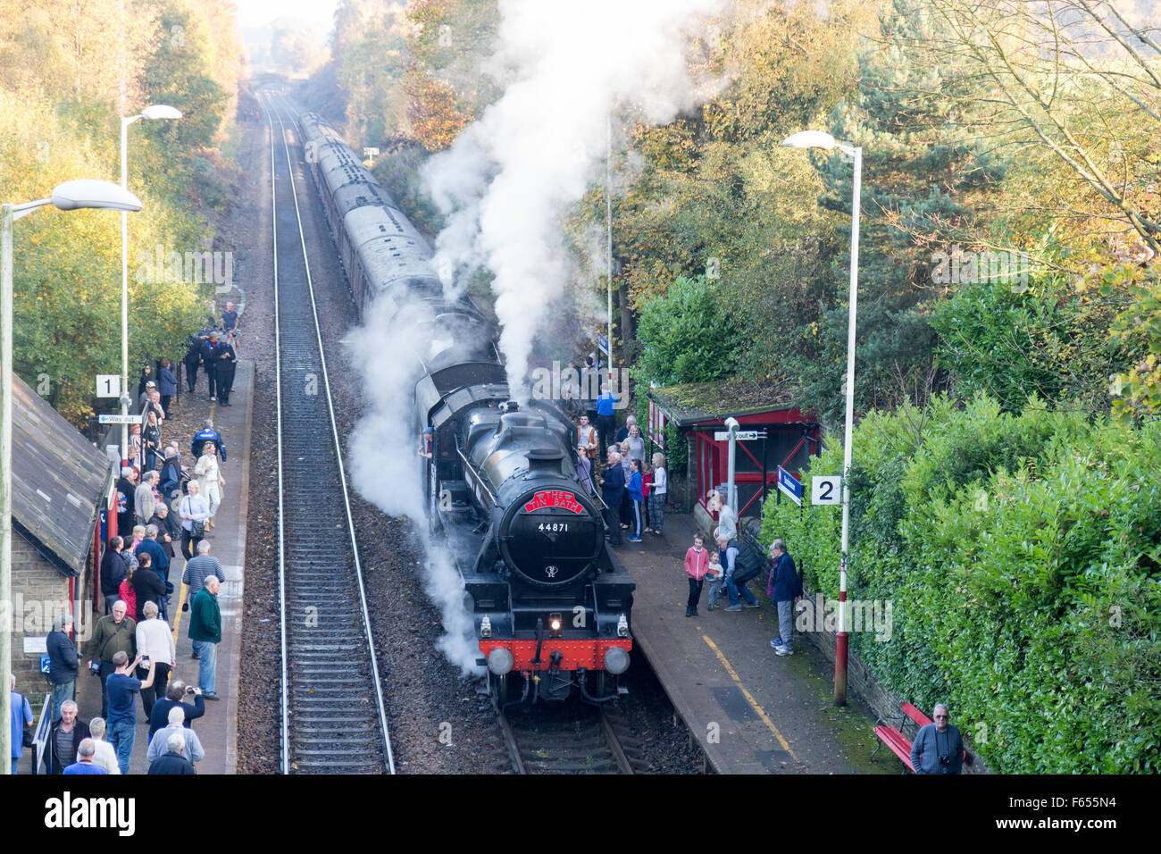A steam train stopping at Stocksmoor station on the Sheffield to ...