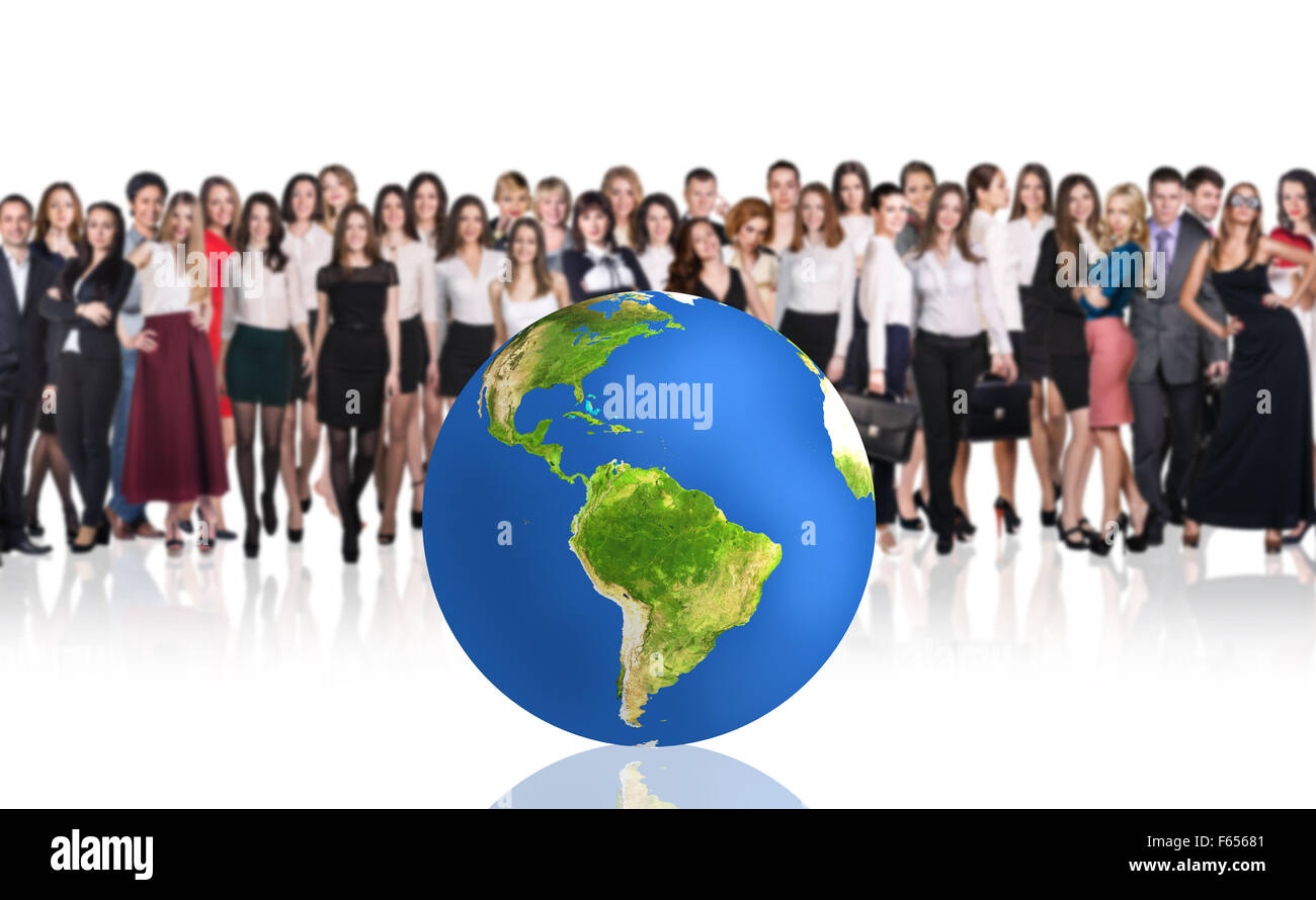Successful businesspeople beside big earth ball Stock Photo - Alamy