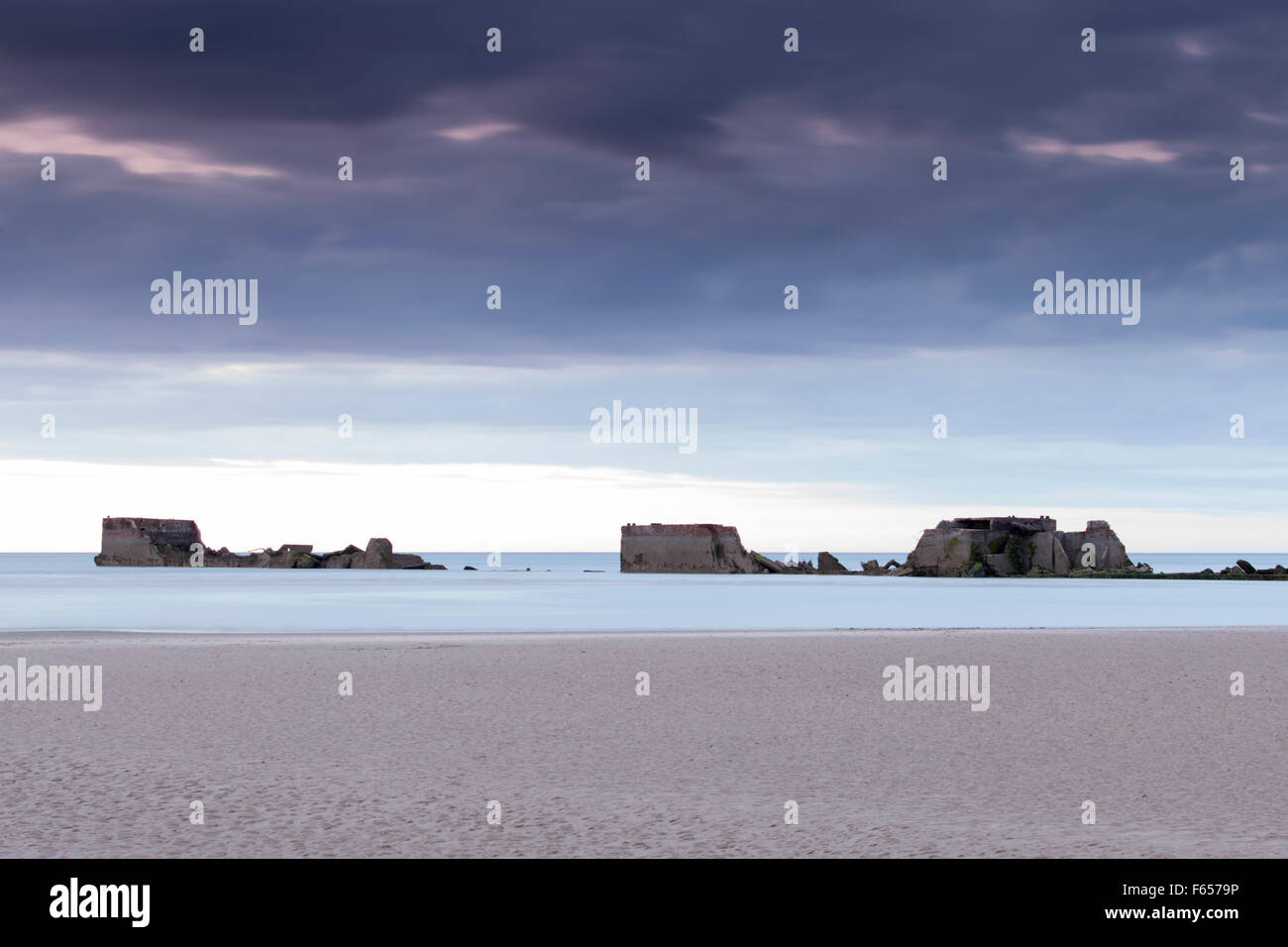 Parts of the remains of the Mulberry Harbour on gold beach Asnelles ...