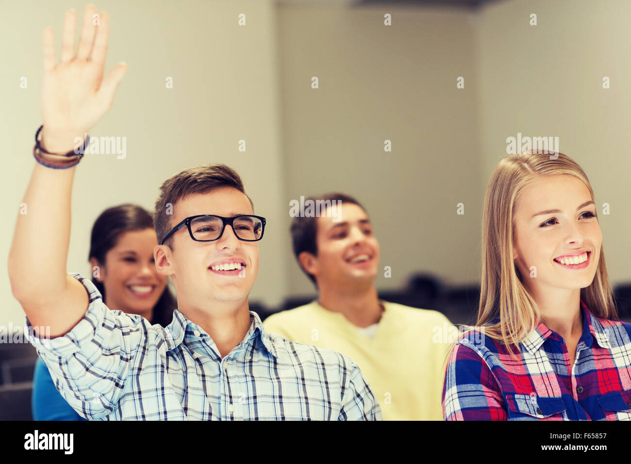 group of smiling students in lecture hall Stock Photo - Alamy