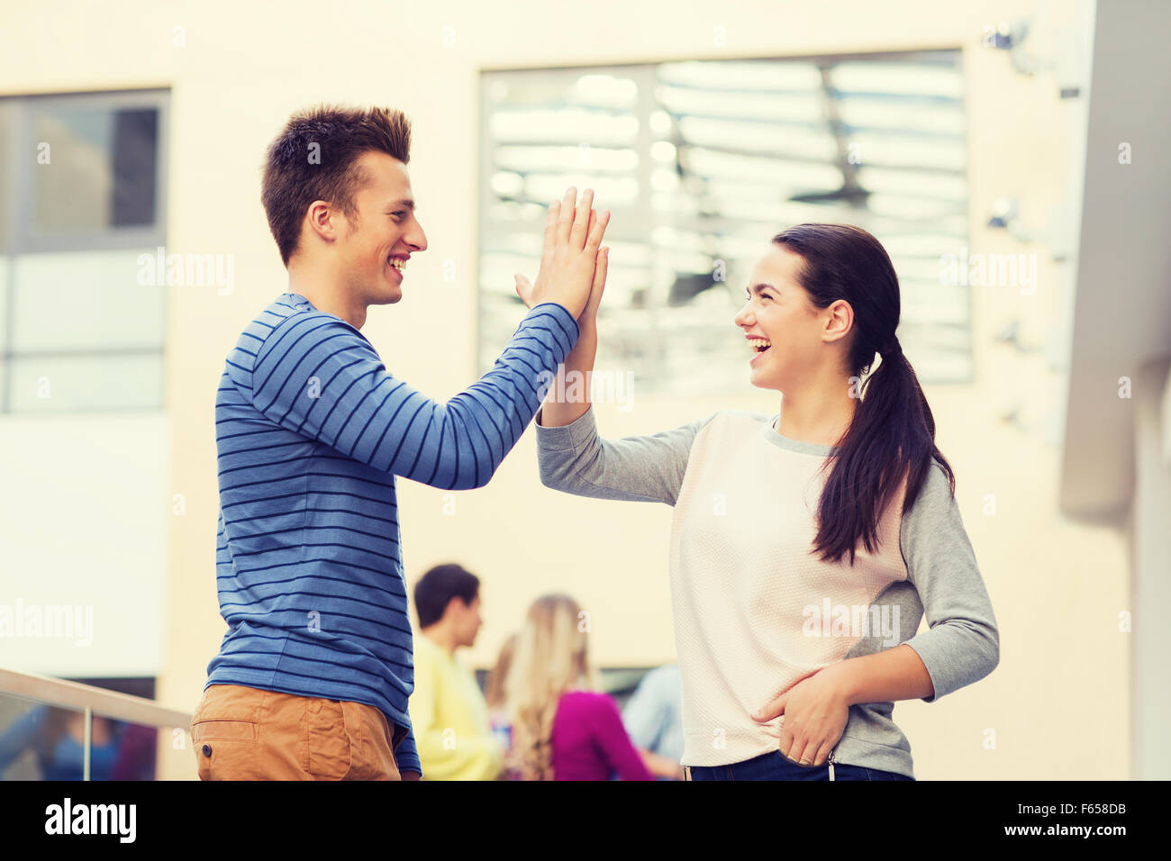 group of smiling students outdoors Stock Photo - Alamy