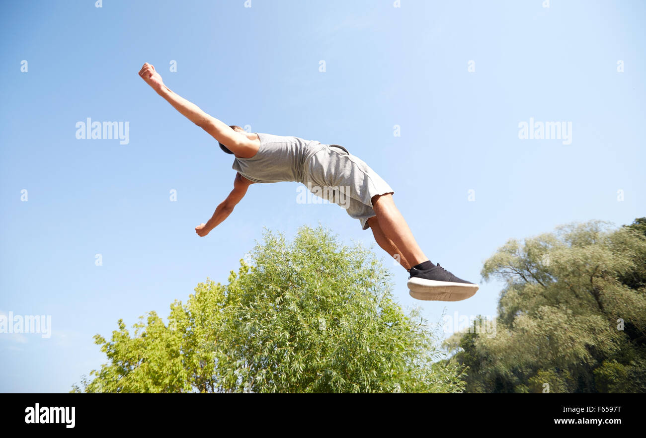 Young man flying levitation jumping hi-res stock photography and images ...