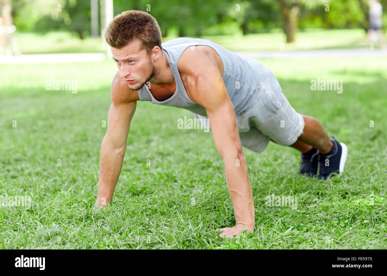 Muscular gymnast doing push ups hi-res stock photography and images - Alamy