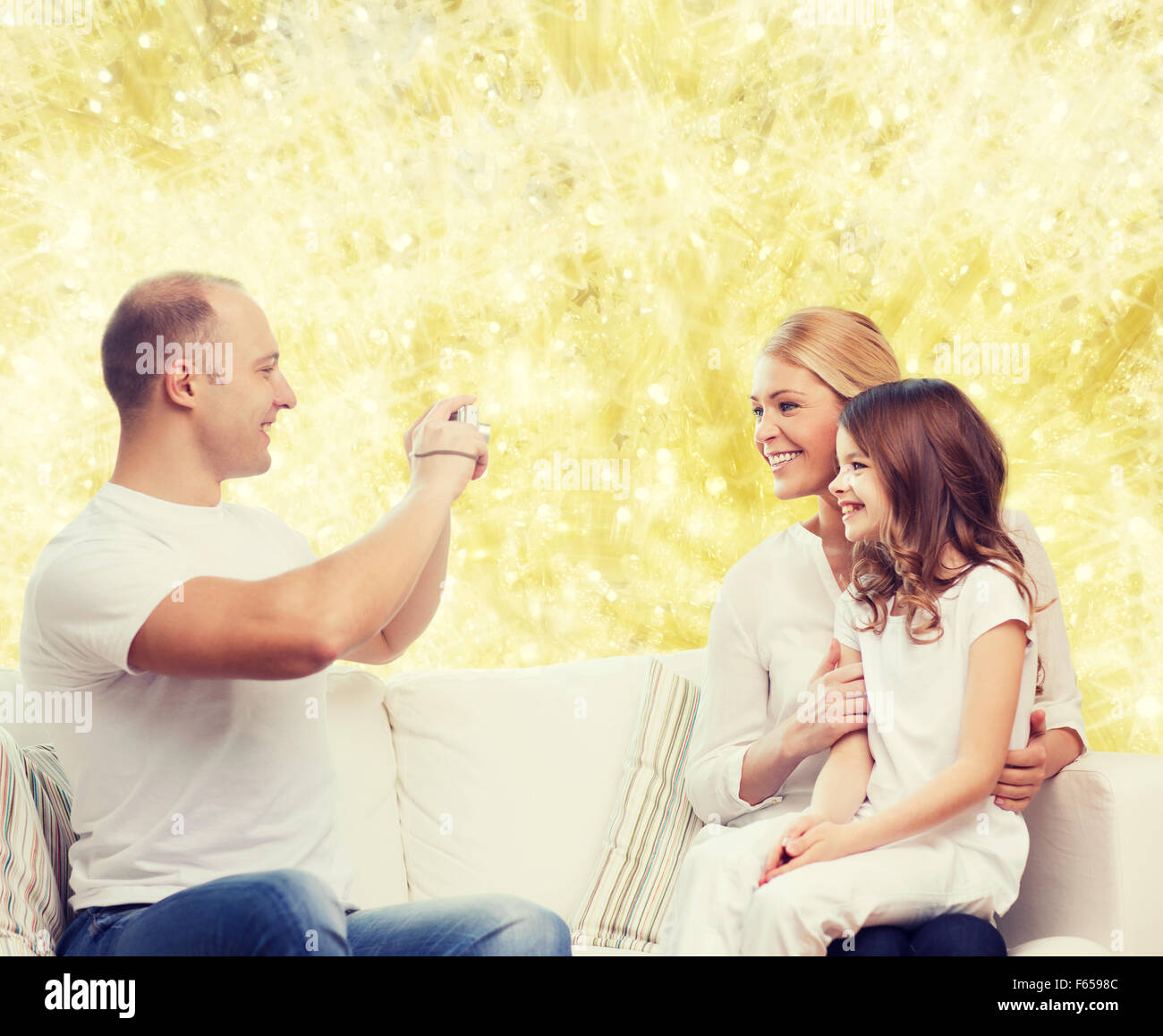 happy family with camera at home Stock Photo - Alamy