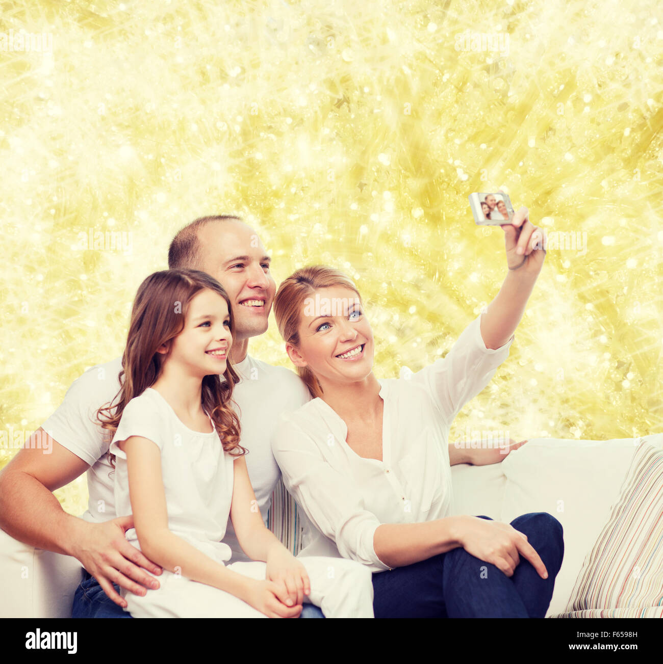 happy family with camera at home Stock Photo - Alamy