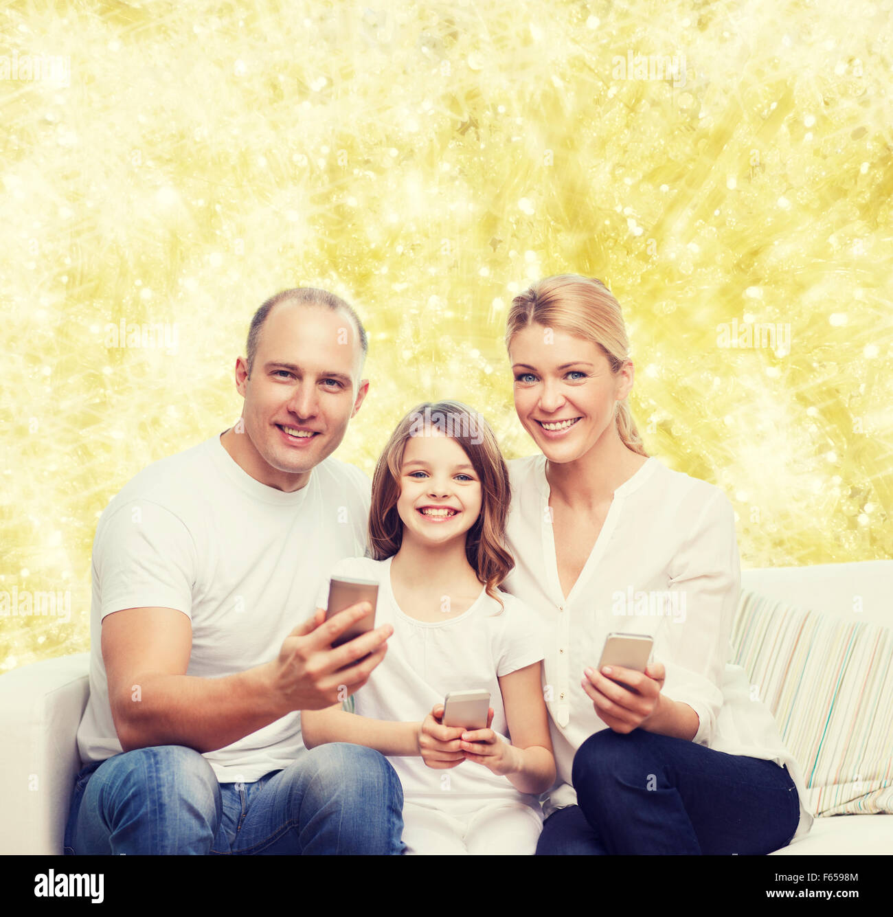 happy family with smartphones Stock Photo - Alamy