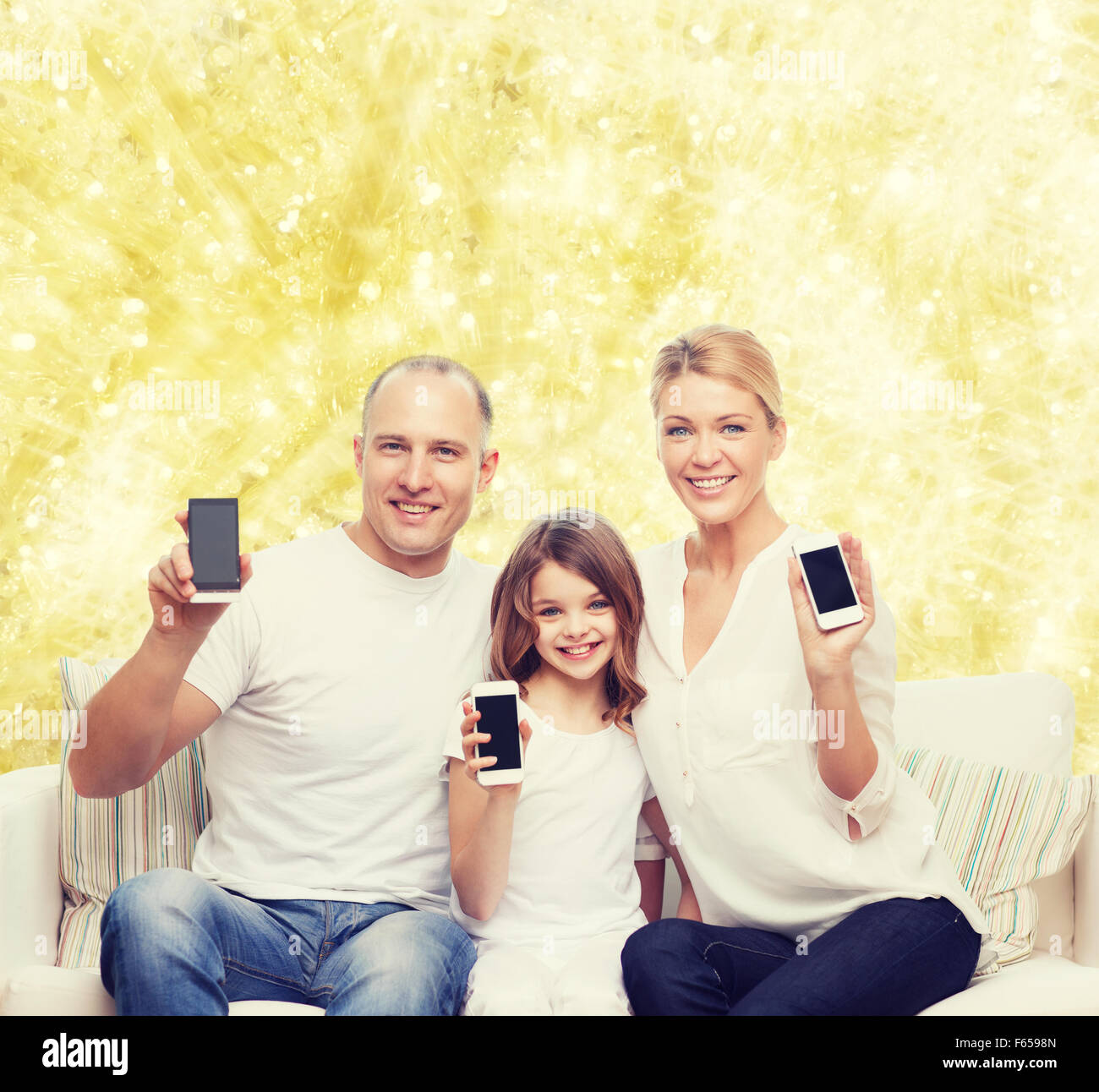 happy family with smartphones Stock Photo - Alamy