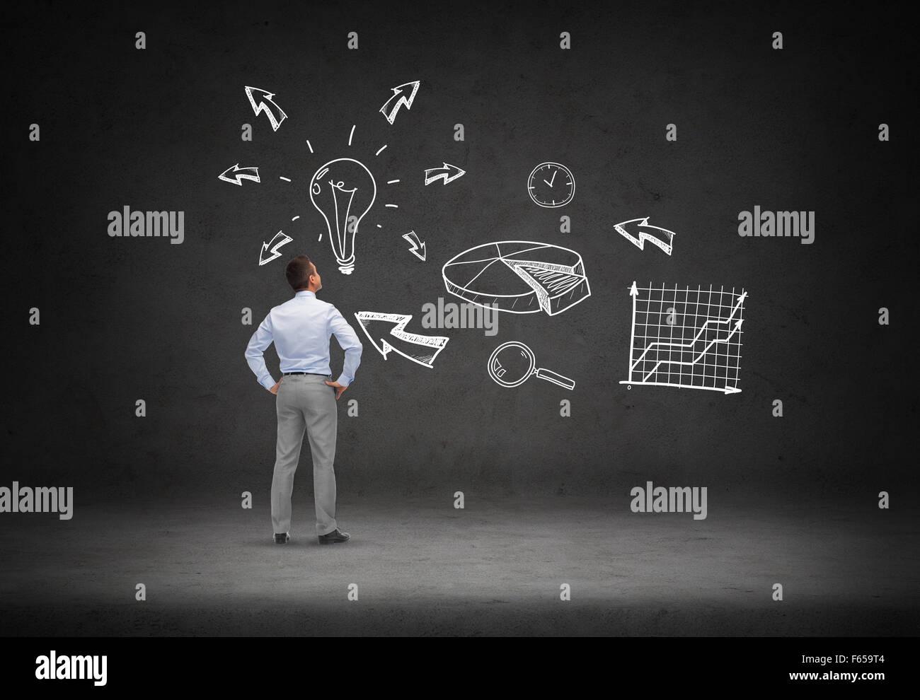 businessman looking at business idea scheme Stock Photo - Alamy