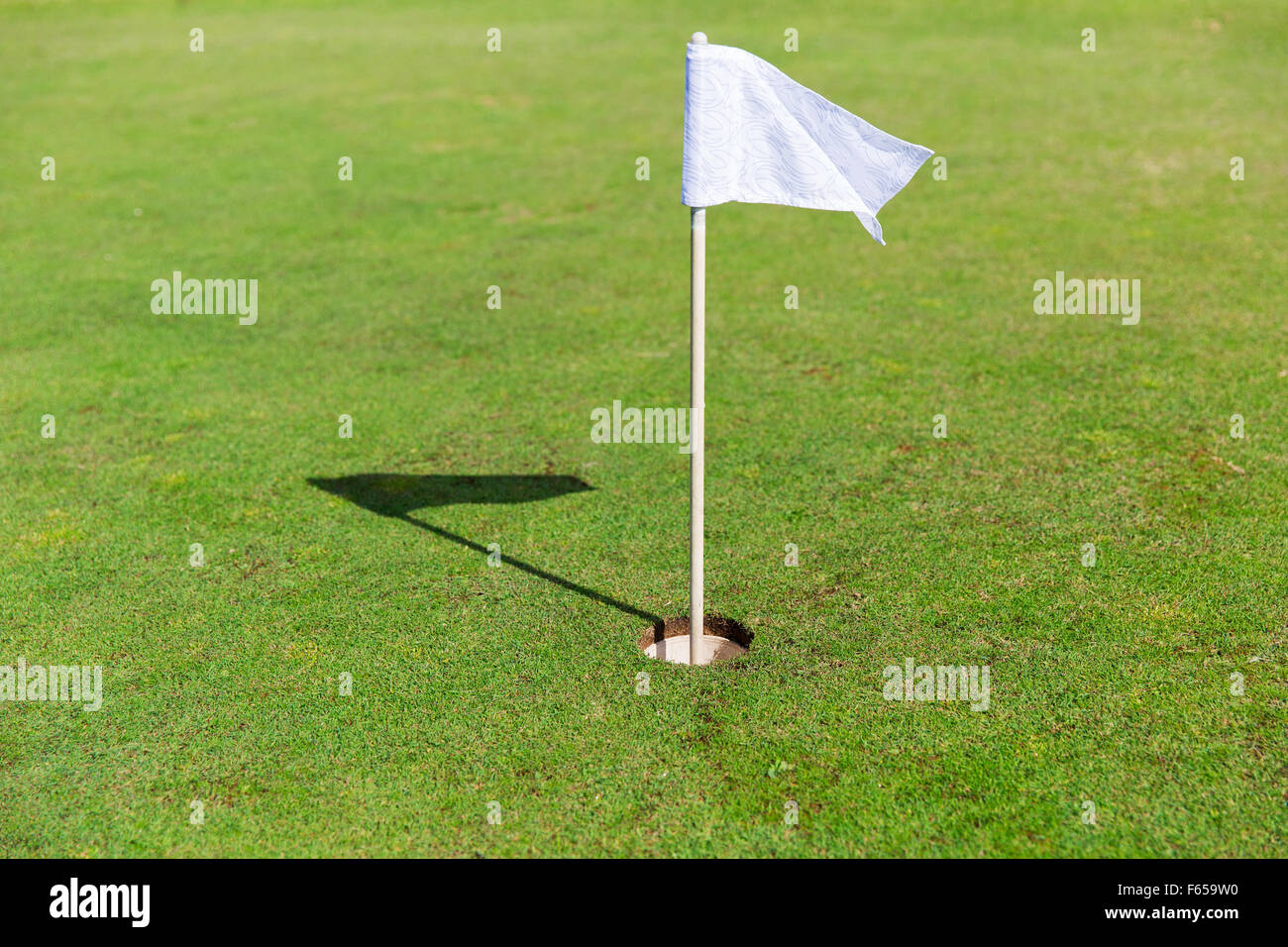 Shadow of golf flag hi-res stock photography and images - Alamy