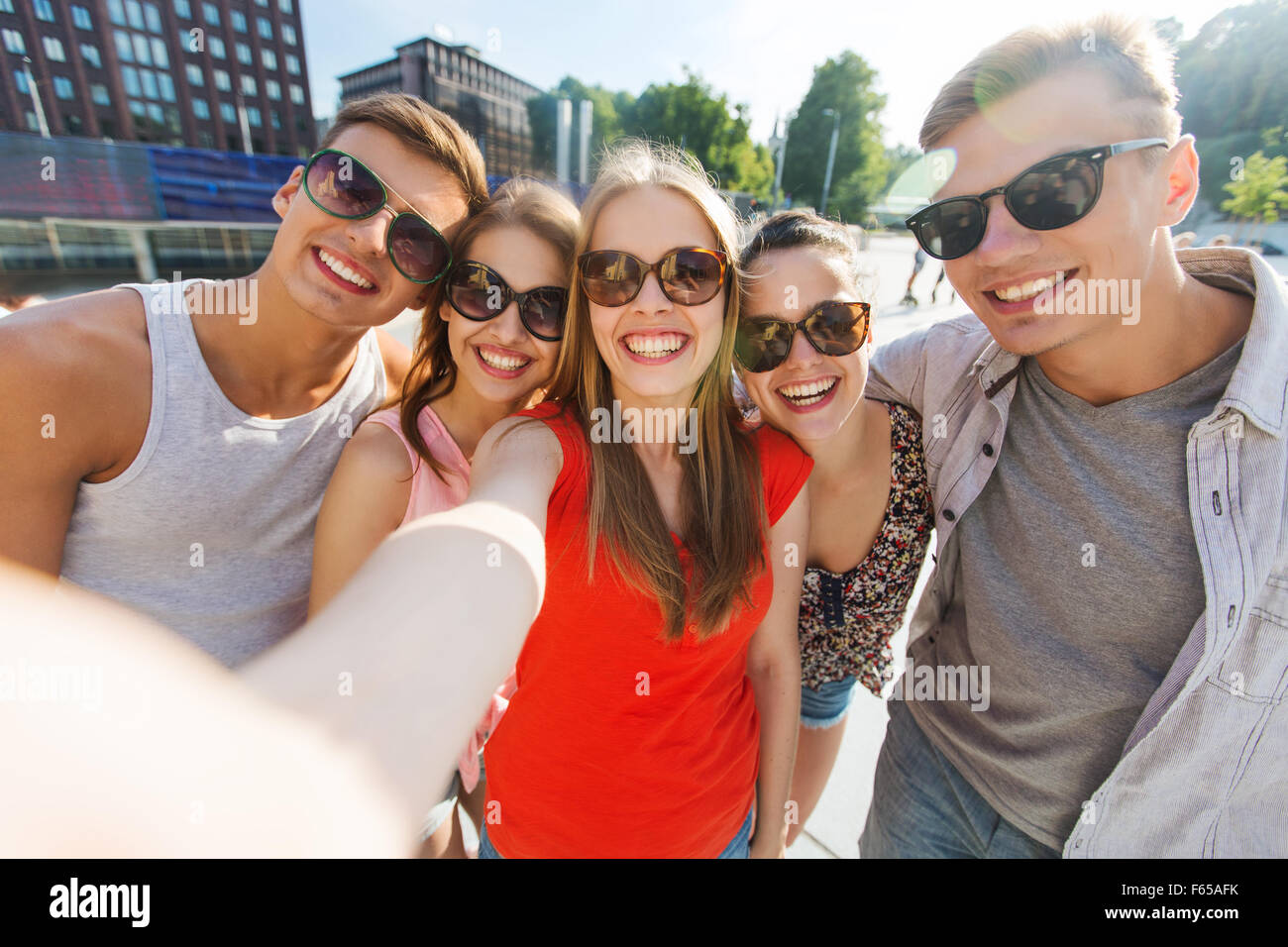 smiling friends taking selfie Stock Photo - Alamy