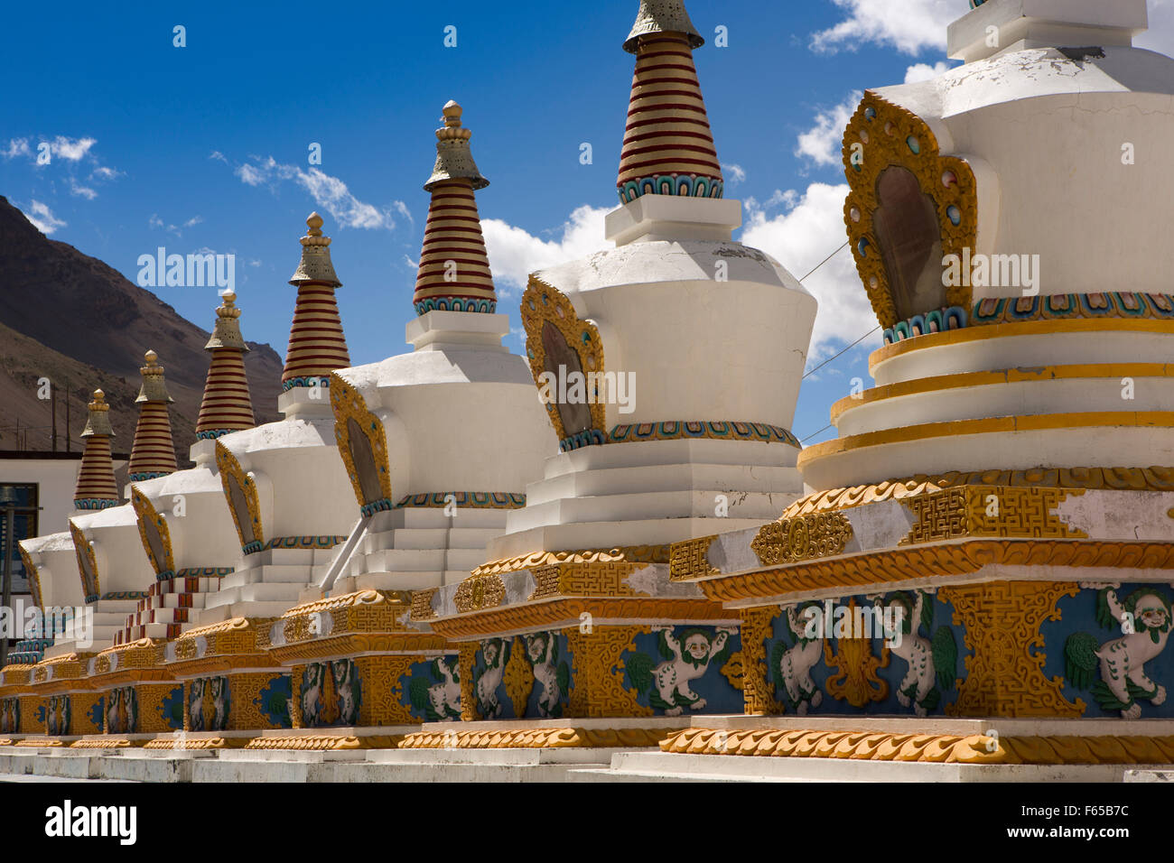 India, Himachal Pradesh, Spiti, Kaza, tourist’s line of chortens ...