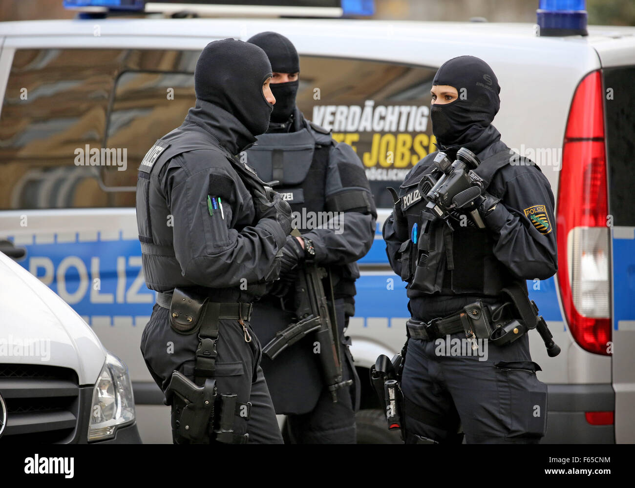 Leipzig, Germany. 12th Nov, 2015. Masked police officers during a drug ...