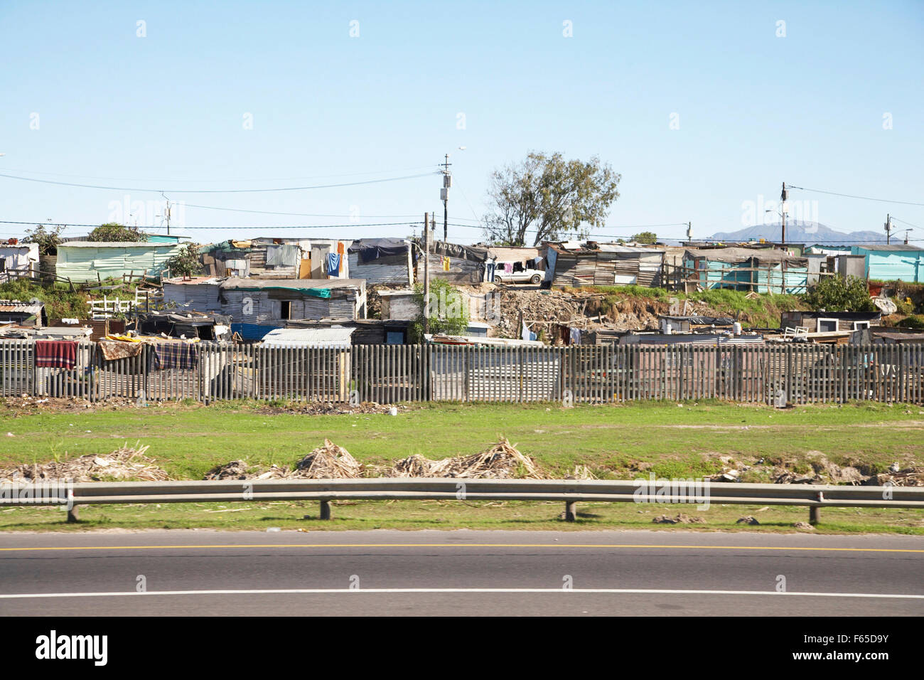View of slums at roadside, South Africa Stock Photo - Alamy