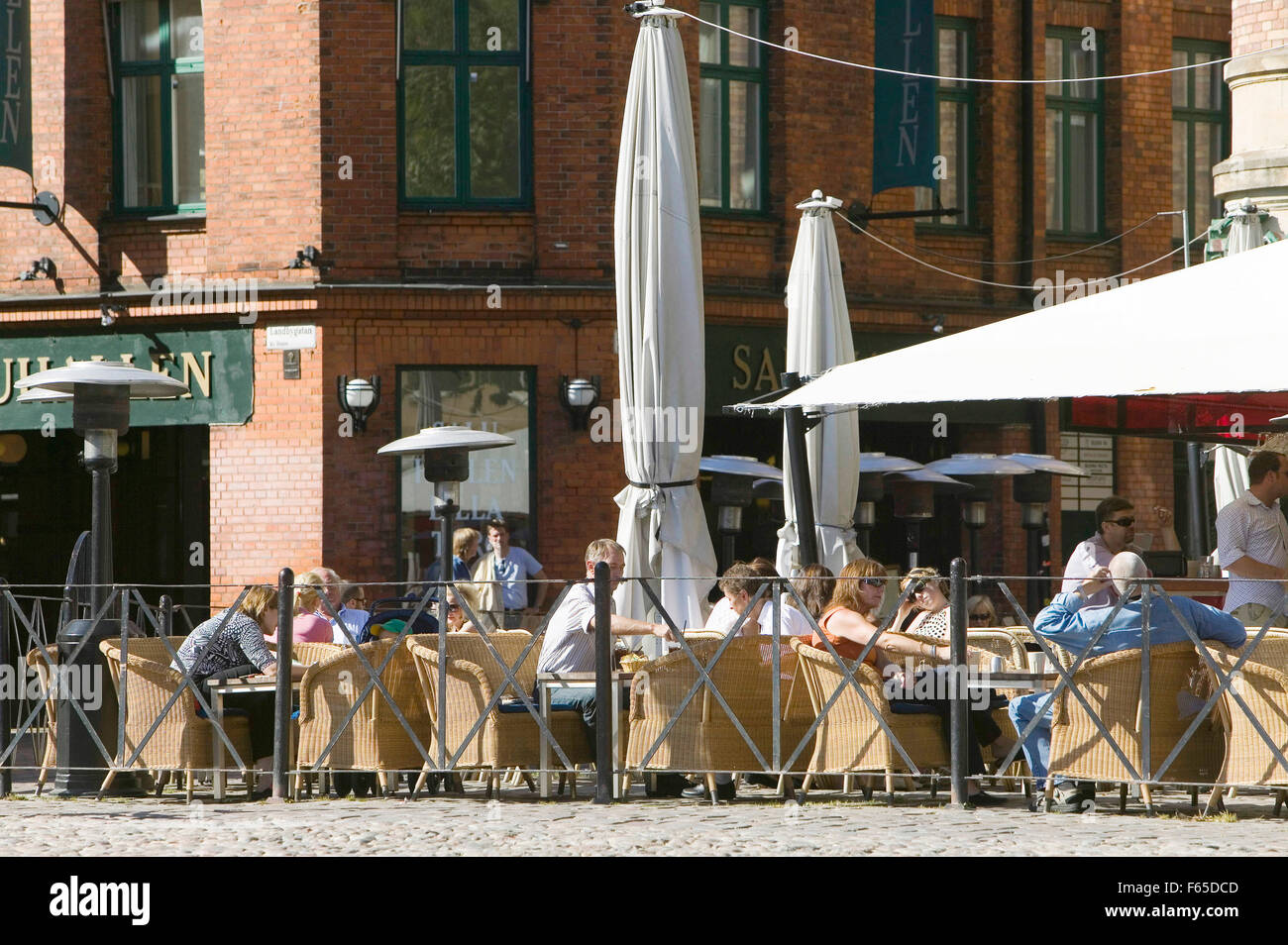 People sitting at cafe in Lilla Torg, Malmo, Sweden Stock Photo - Alamy