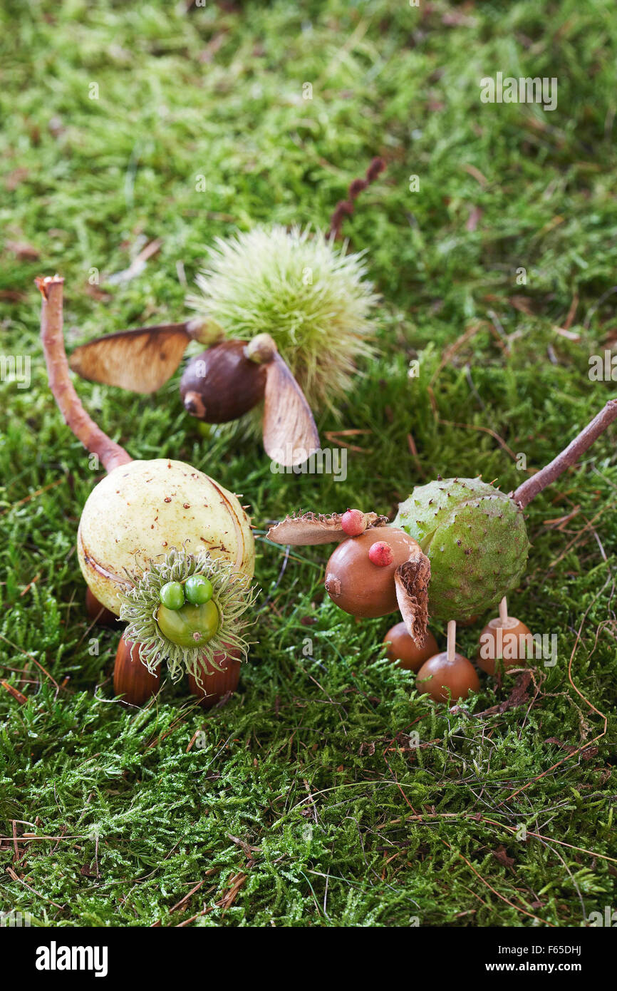 Tinkered pigs and hedgehog crafted from horse-chestnut, grass seeds and ...