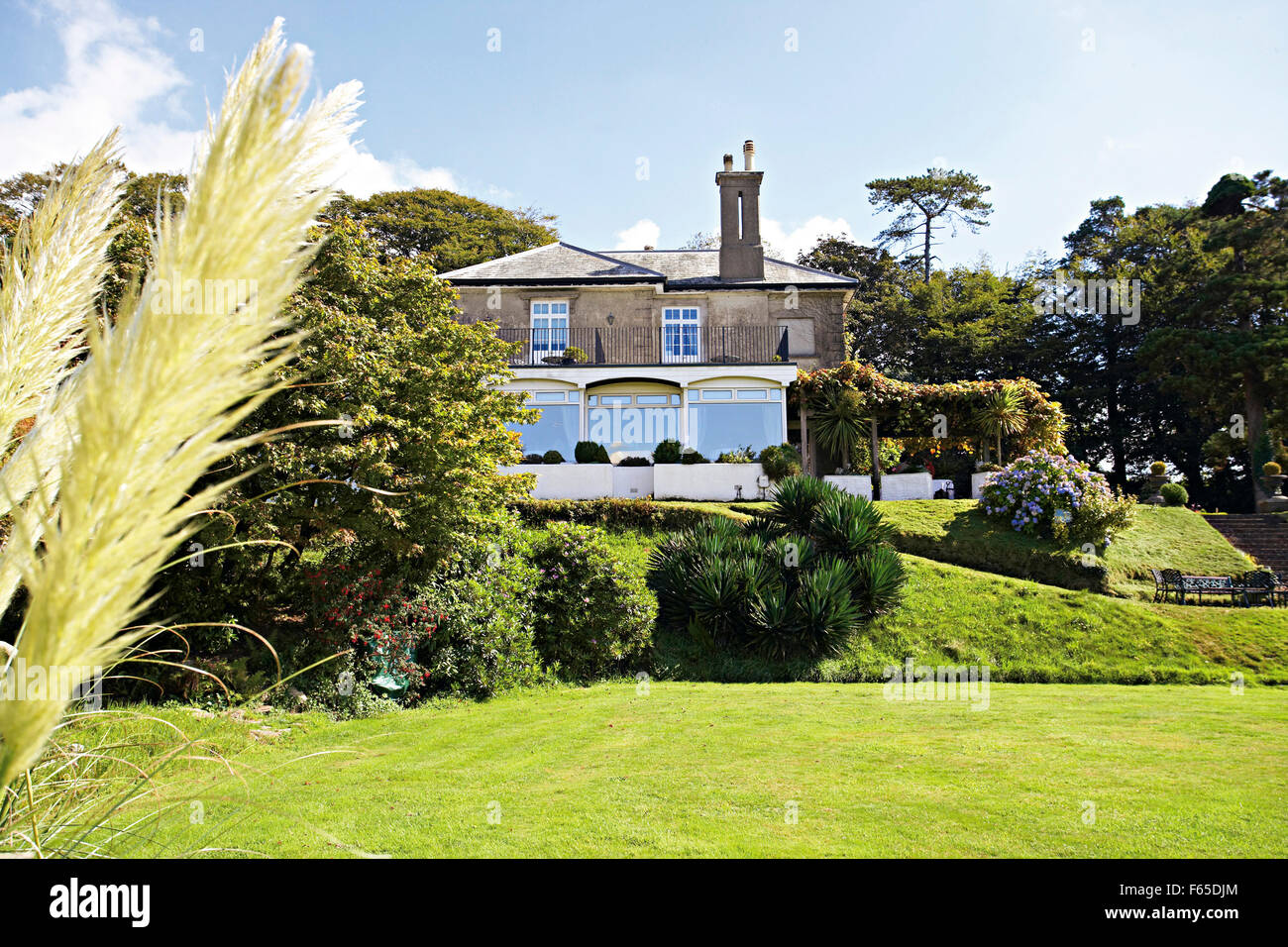 View of country house The Horn Of Plenty with garden in Devon, UK Stock ...