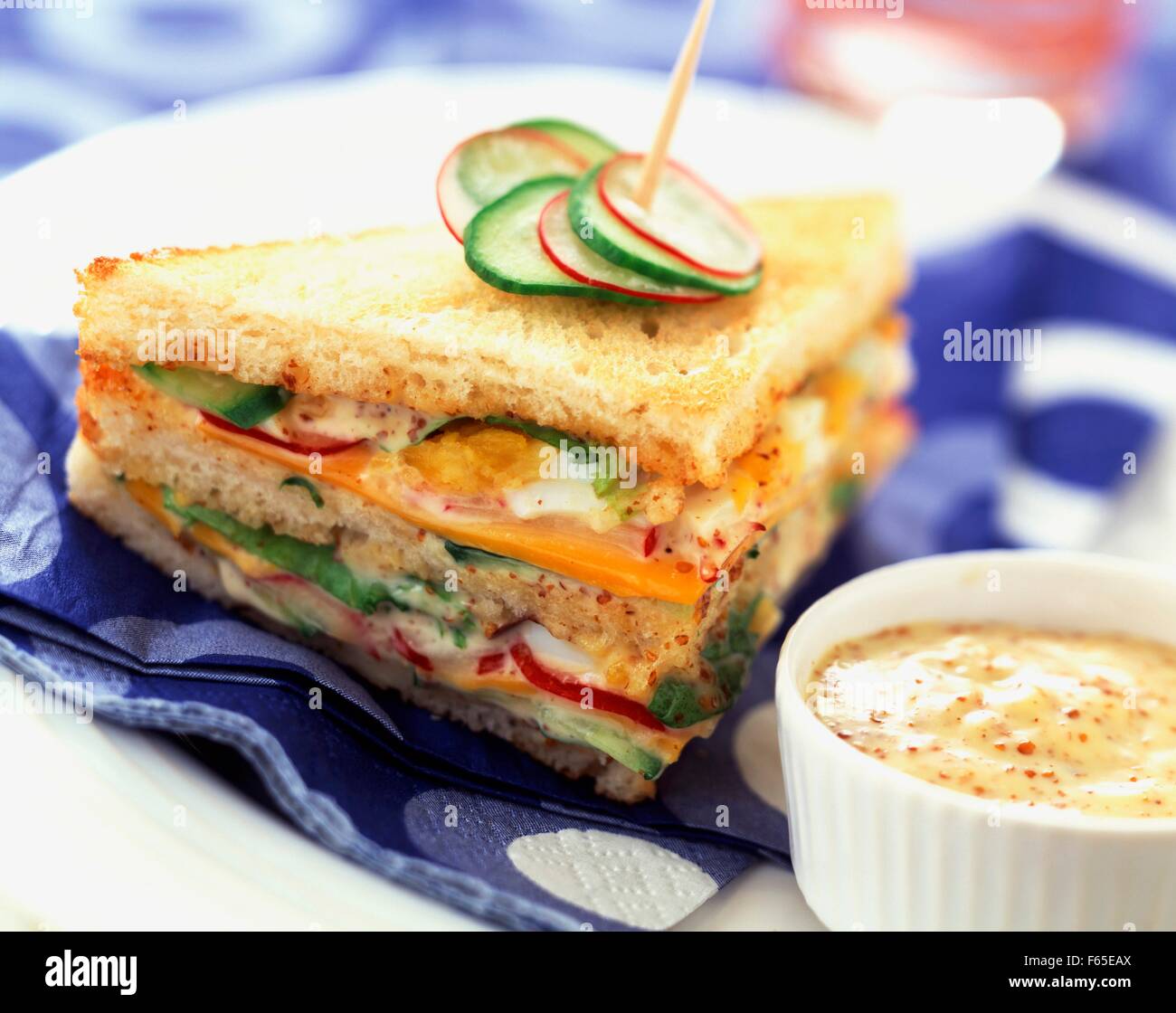 Raw vegetable club sandwich with mustard Stock Photo - Alamy