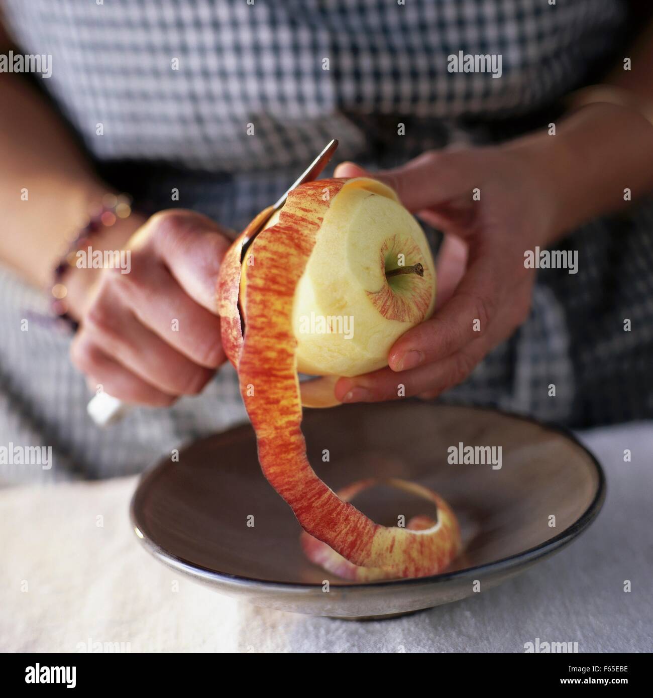 woman peeling apple Stock Photo - Alamy