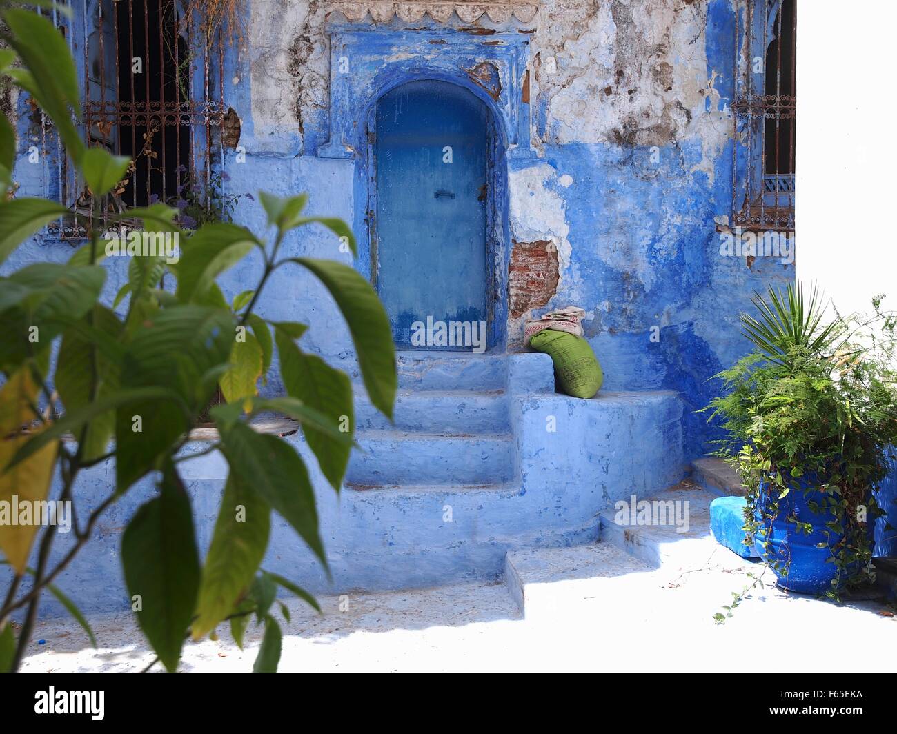 The entrance to a house in one of the blue alleyways of Chefchaouen ...