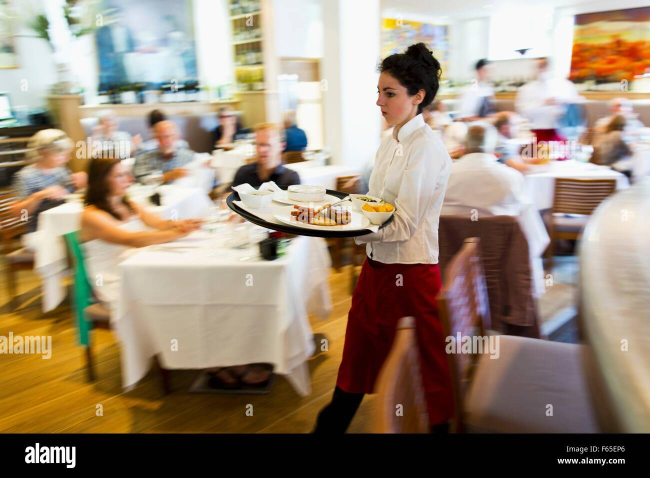 Waitress serving in seafood restaurant hi-res stock photography and ...