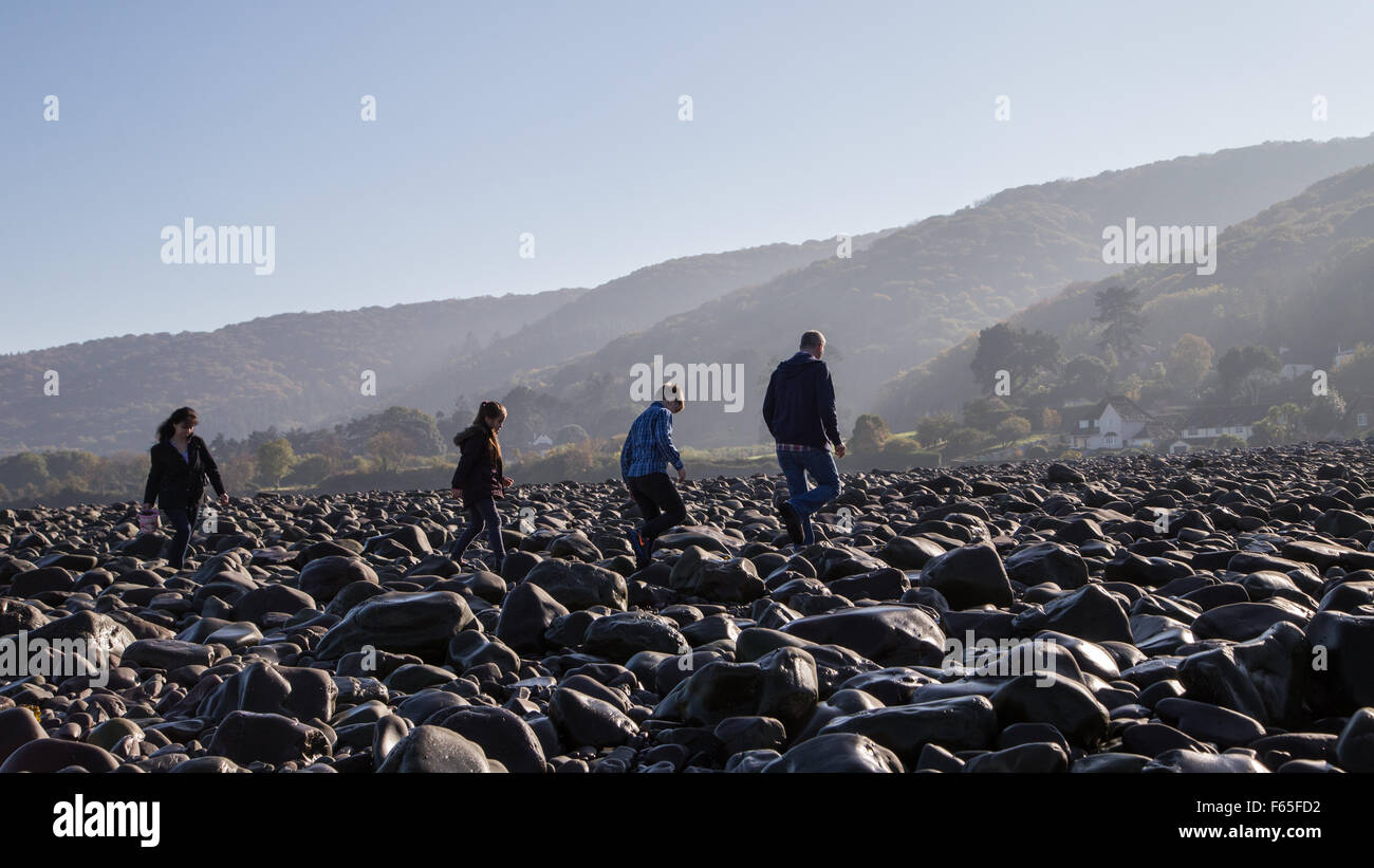 Fossil hunting at Porlock Weir coastline and beach on the outskirts of ...