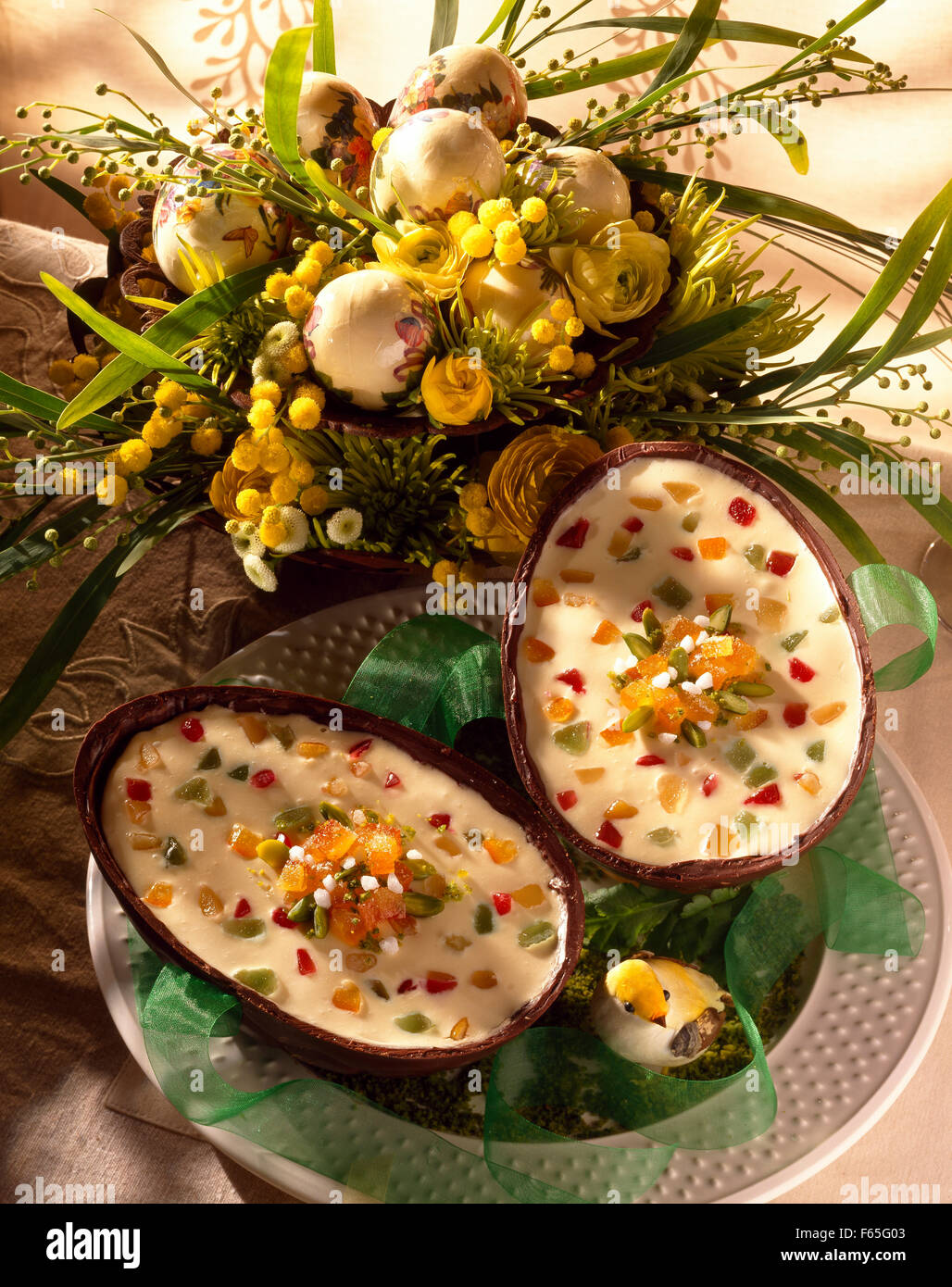 Surprise Easter egg filled with custard and candied fruit Stock Photo ...